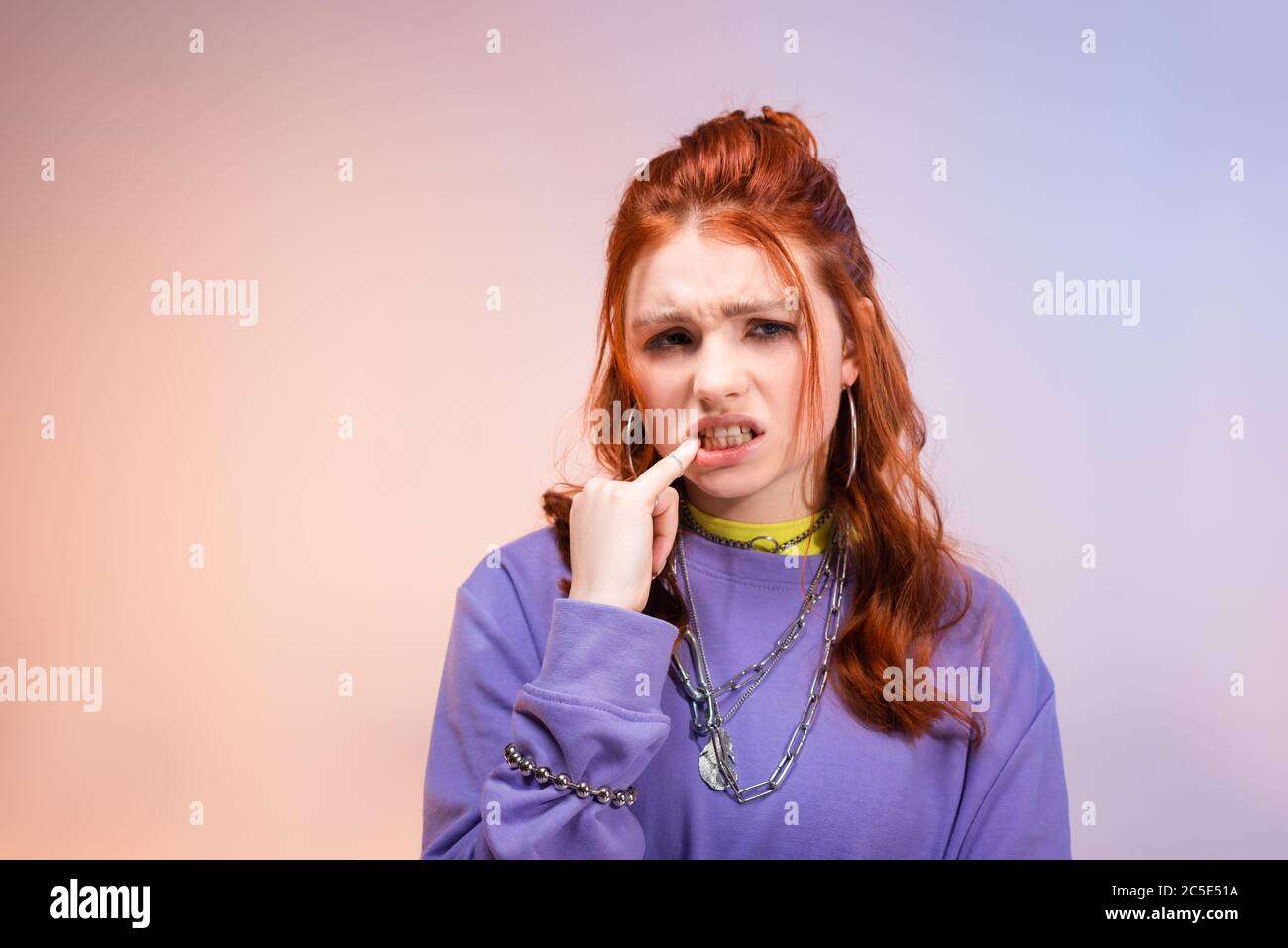 Biting finger hi-res stock photography and images - Alamy