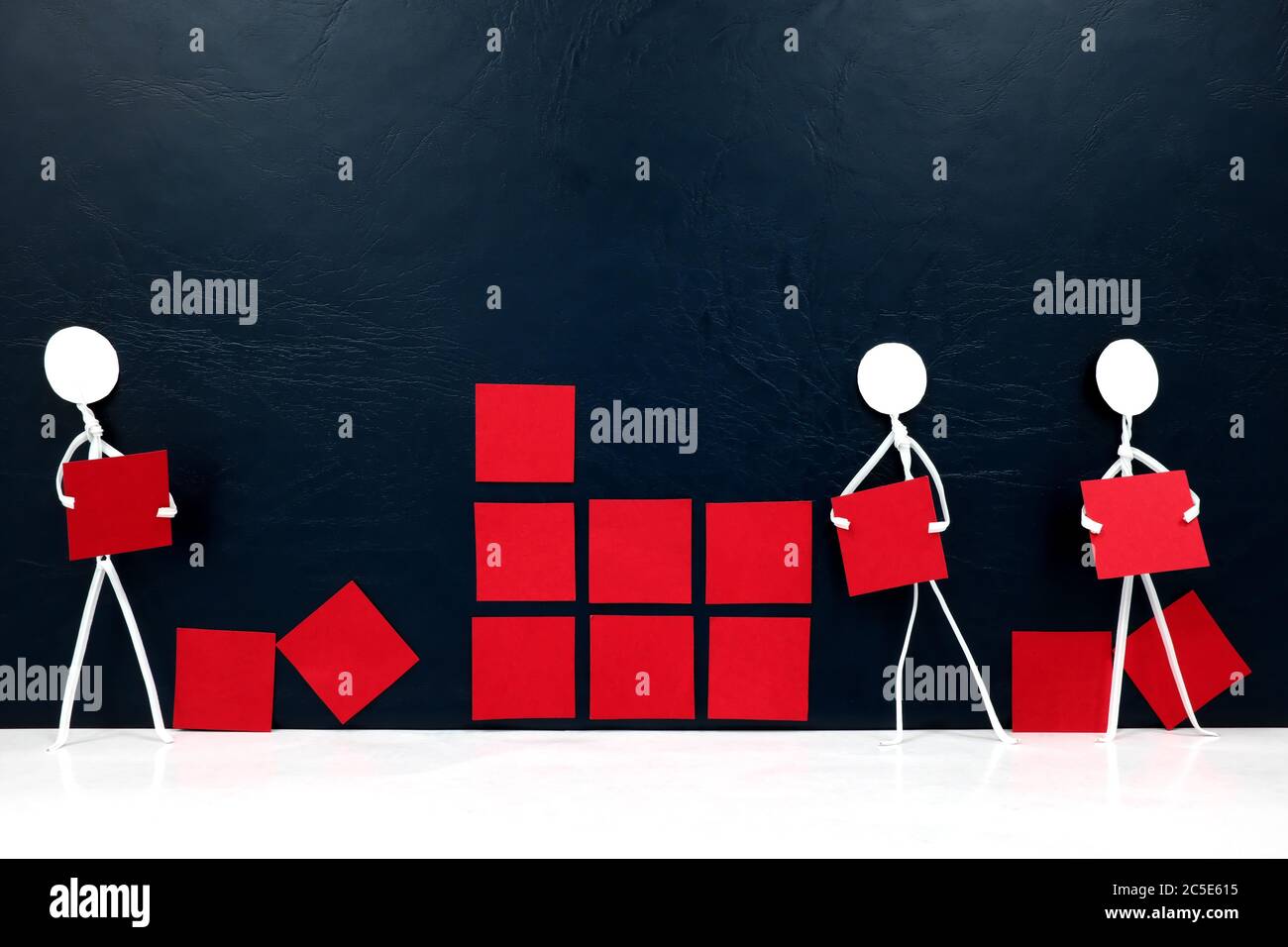 Teamwork, cooperation and rebuilding business concept. Human stick ...