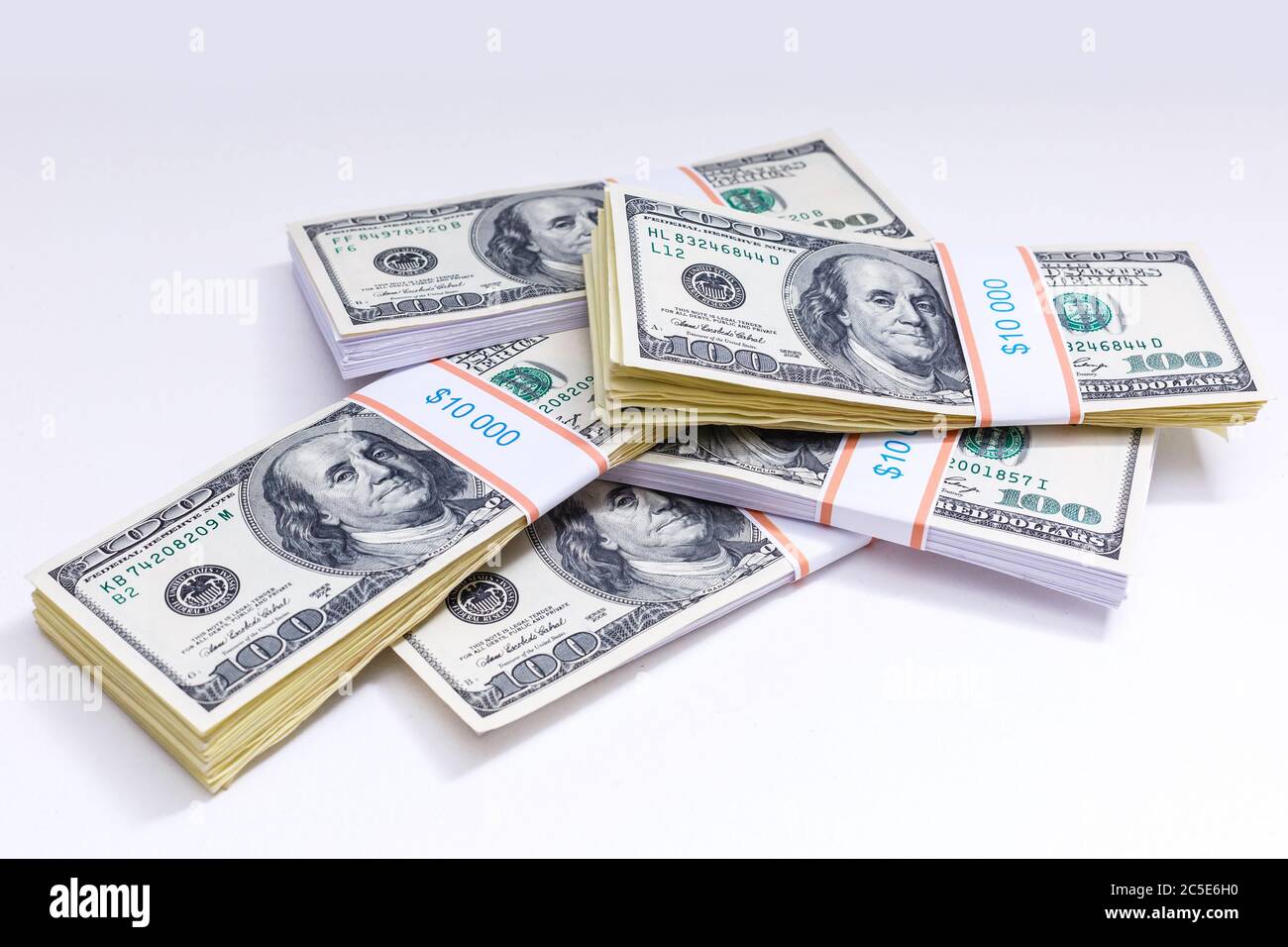 Colection of packs of dollars isolated on white background Stock Photo ...