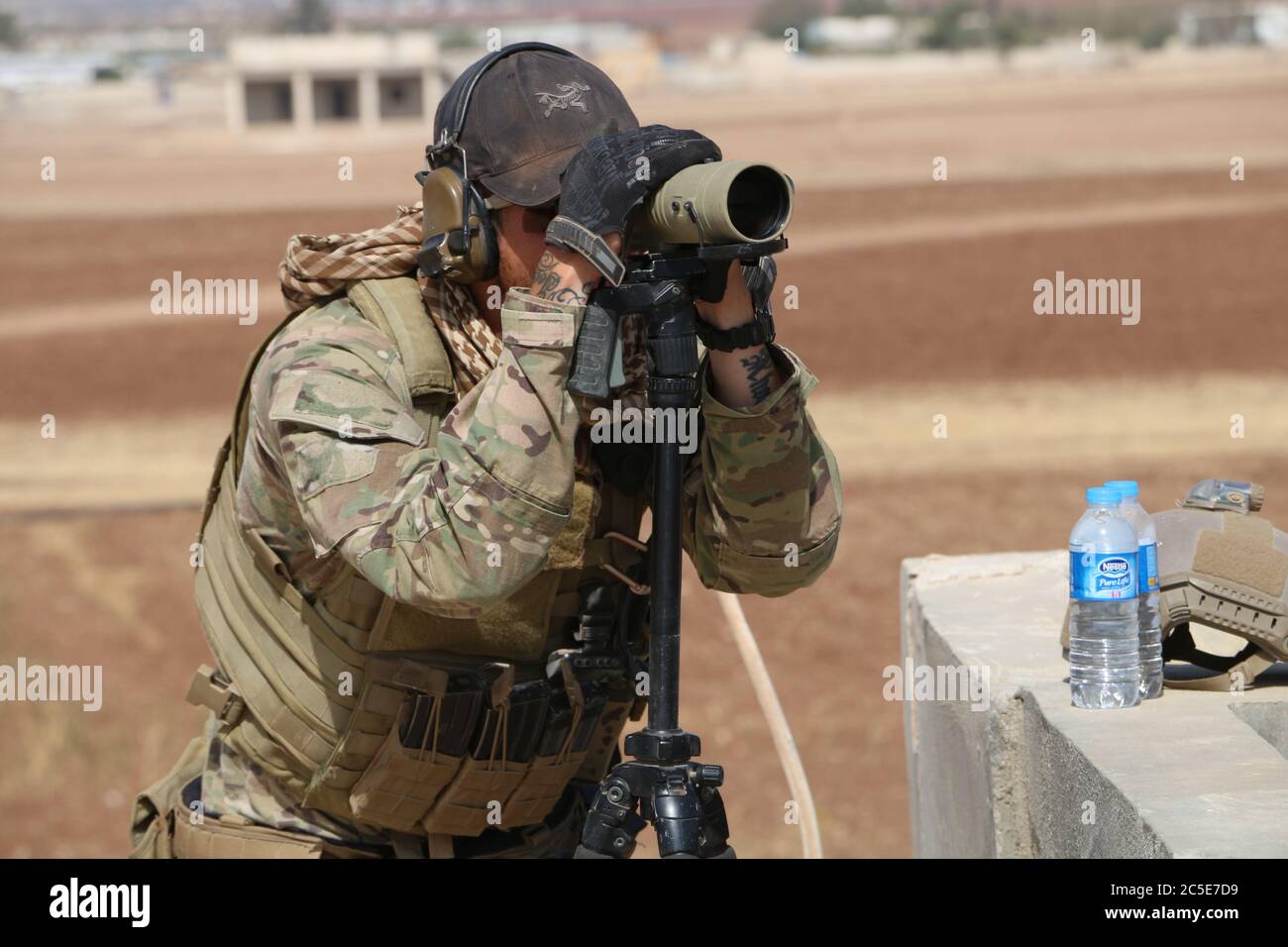 Soldiers standing on the back of the tank Stock Photo - Alamy