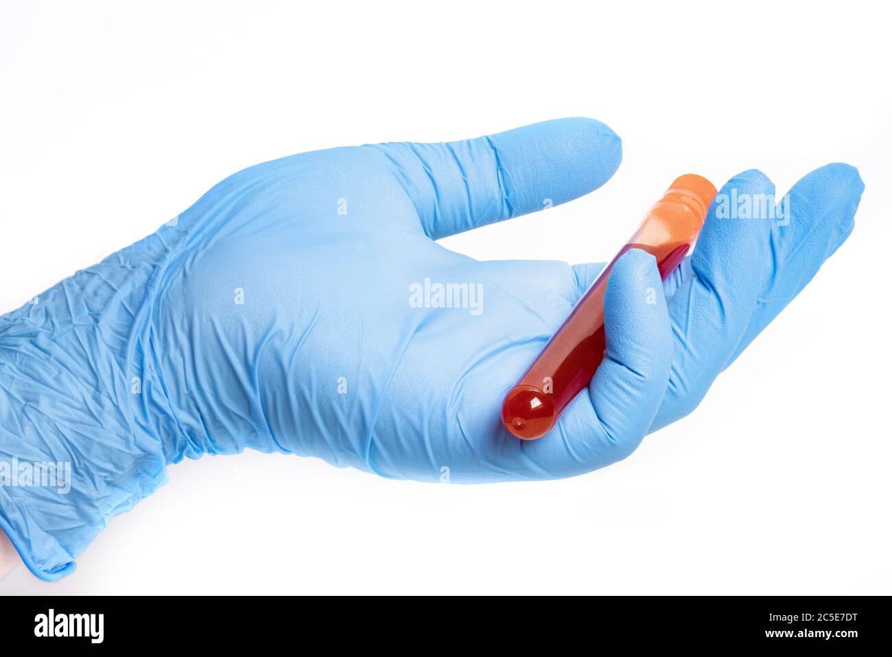 Hand with blue glove holding a long tube with blood Stock Photo - Alamy