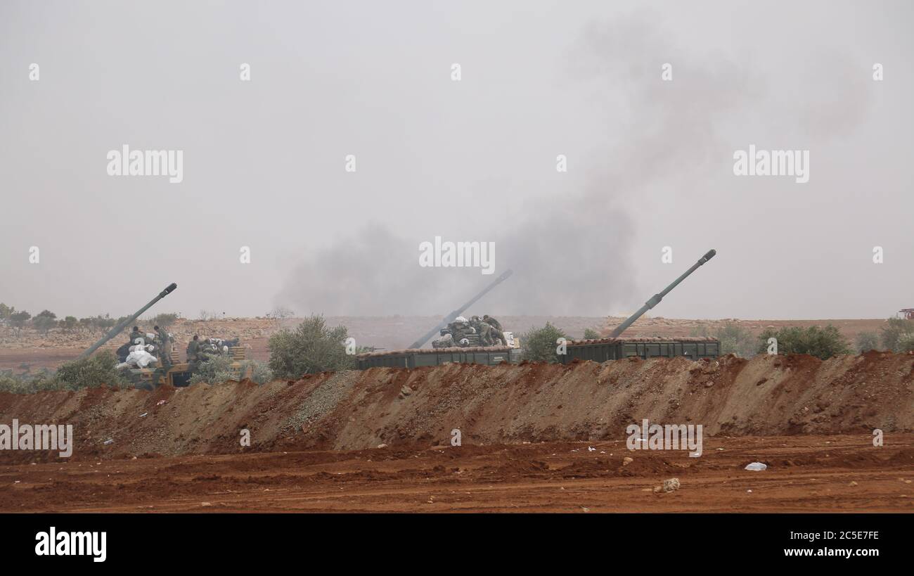 Turkish tank walking, soldier looking down the road from the tank tower ...
