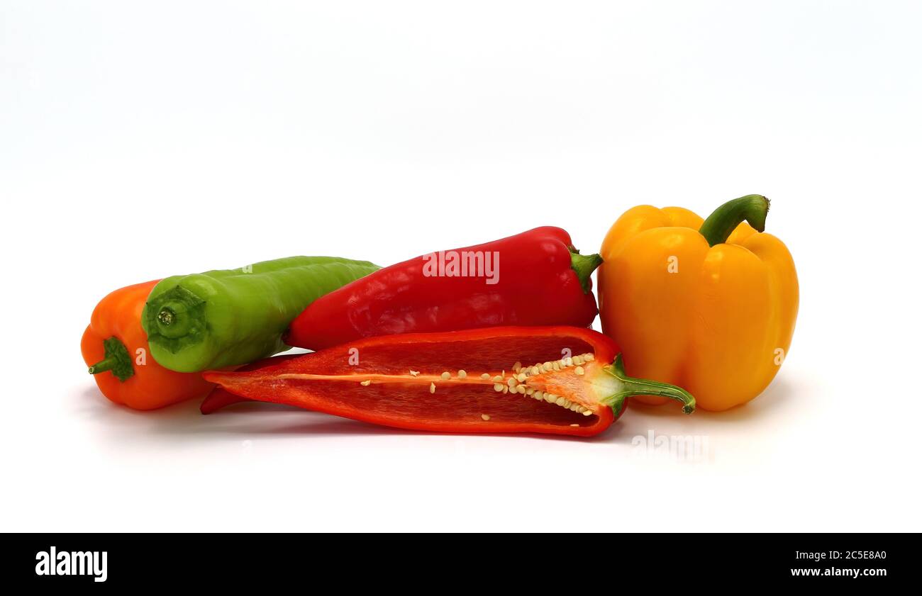 Composition of several sweet peppers and their halves of different ...