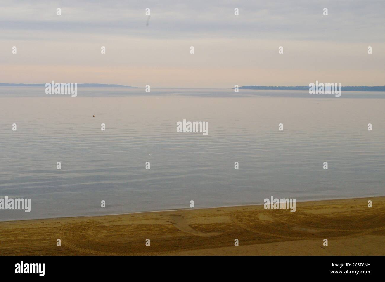 Lake ripples to sandy beach,Serene Beach Golden sand,Traverse City Bay ...