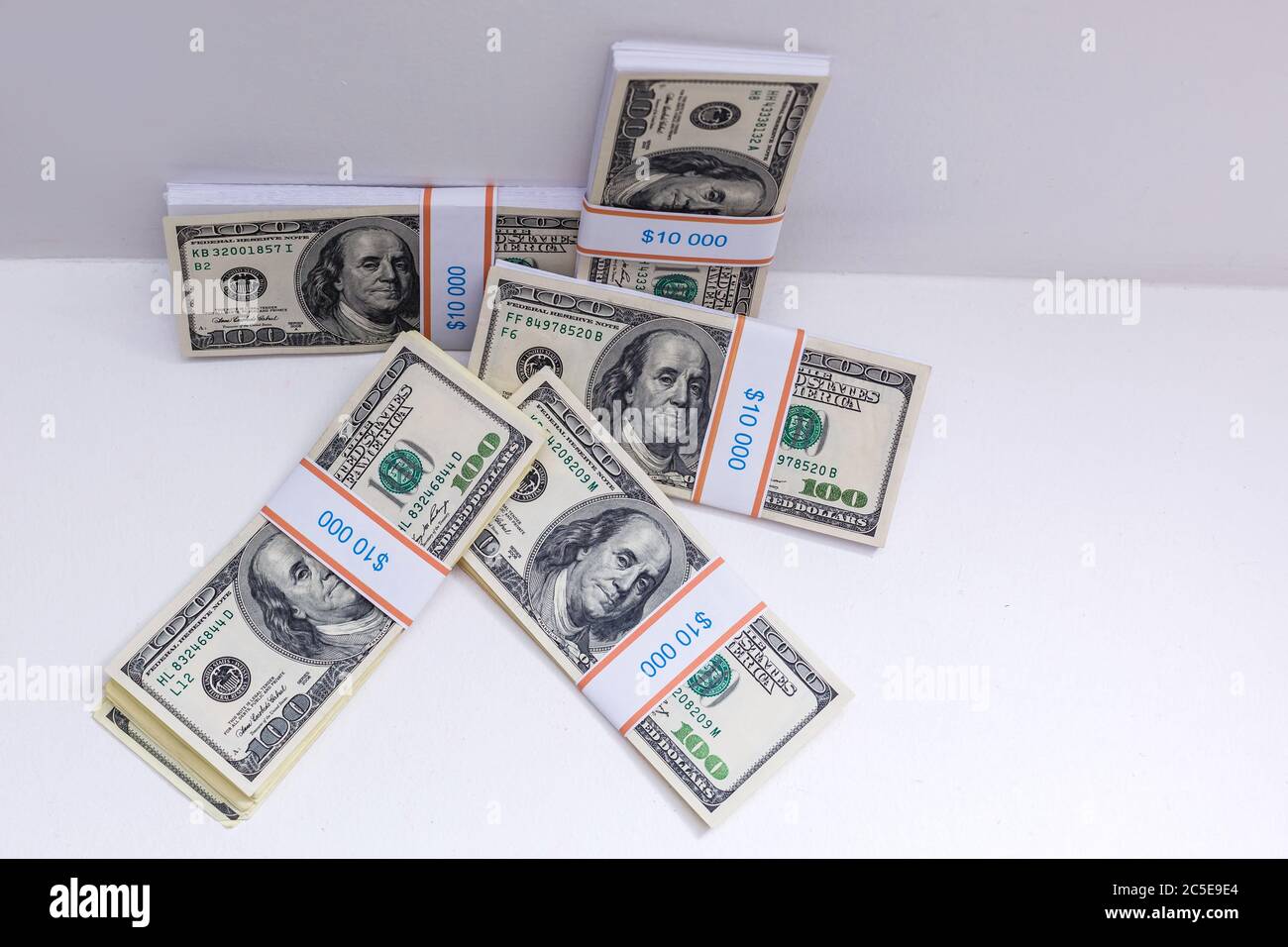 Colection of packs of dollars isolated on white background Stock Photo ...