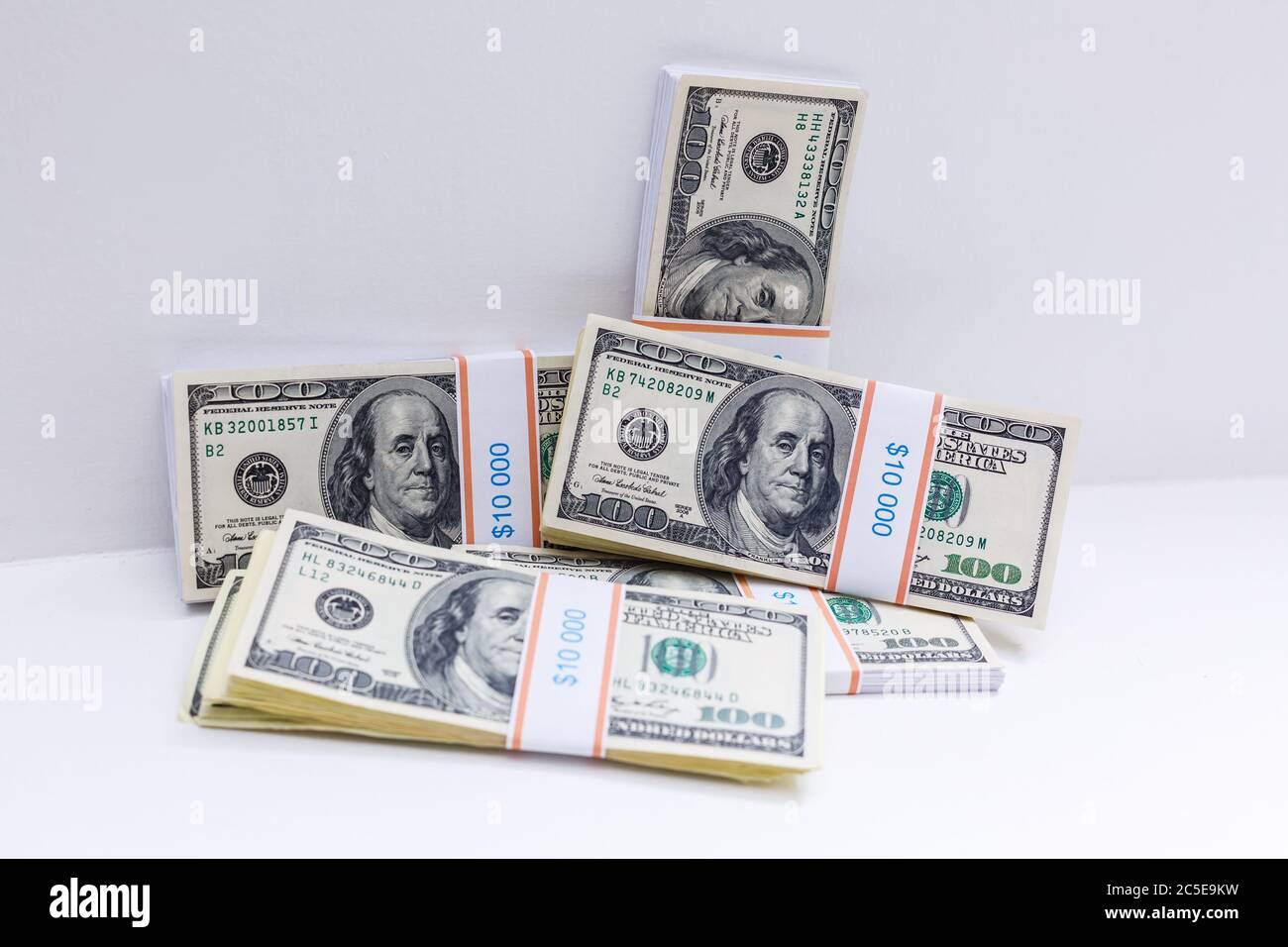 Colection of packs of dollars isolated on white background Stock Photo ...