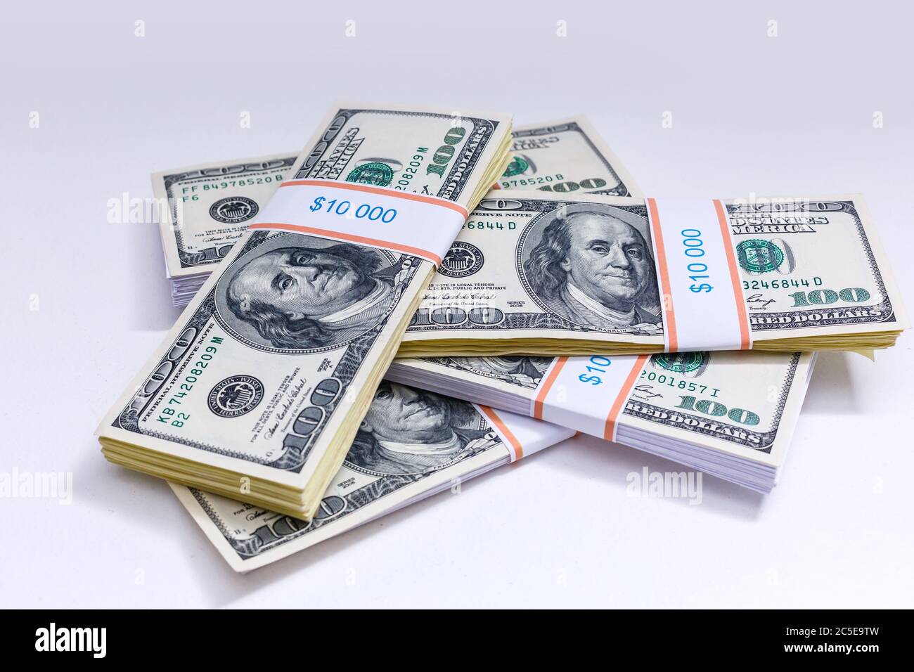 Colection of packs of dollars isolated on white background Stock Photo ...
