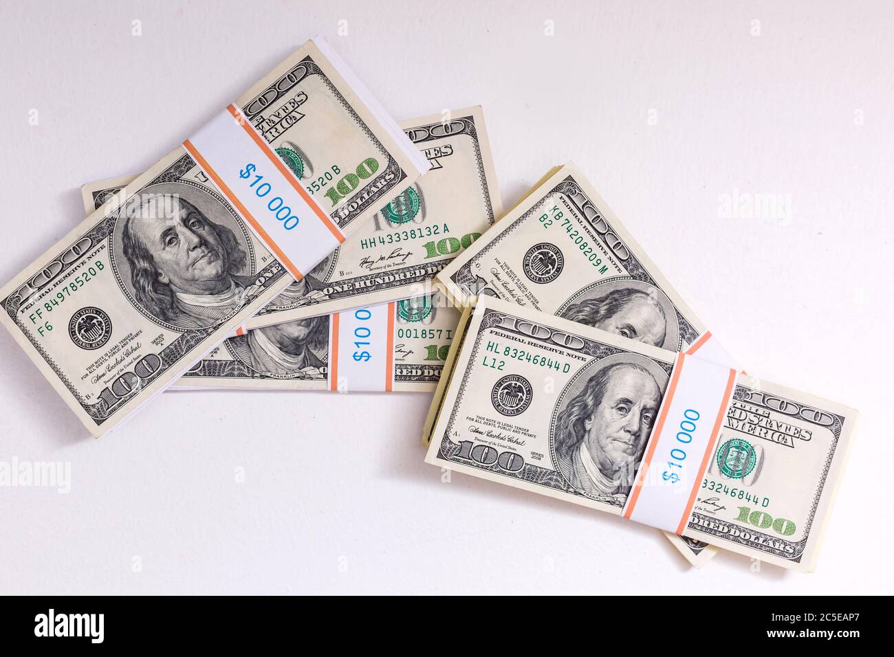 Colection of packs of dollars isolated on white background Stock Photo ...