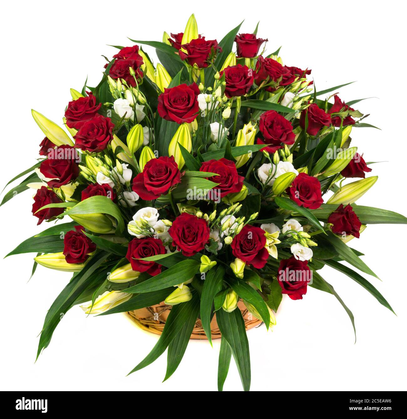 Natural red roses in a basket isolated on white background Stock Photo ...