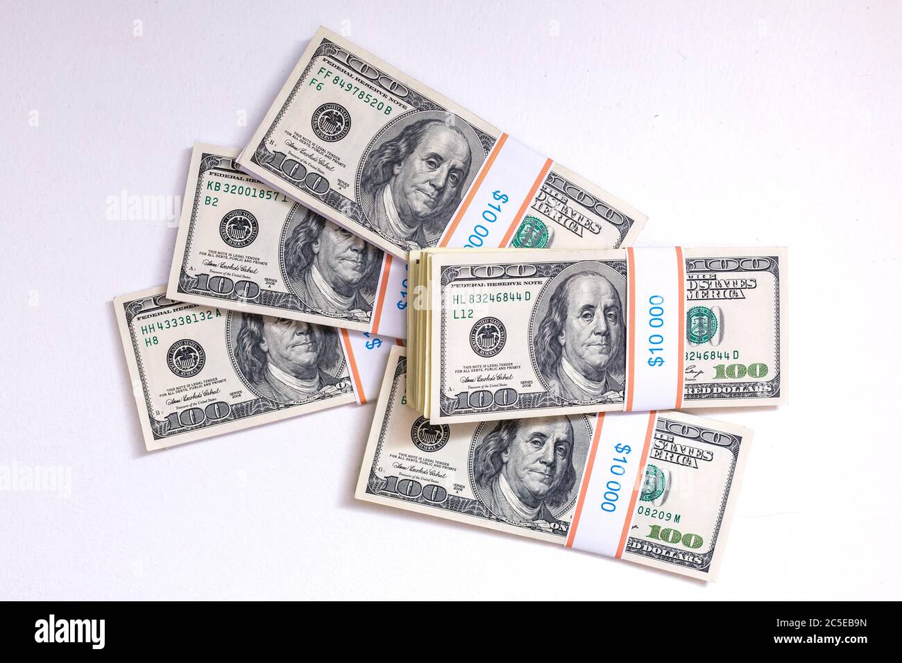 Colection of packs of dollars isolated on white background Stock Photo ...