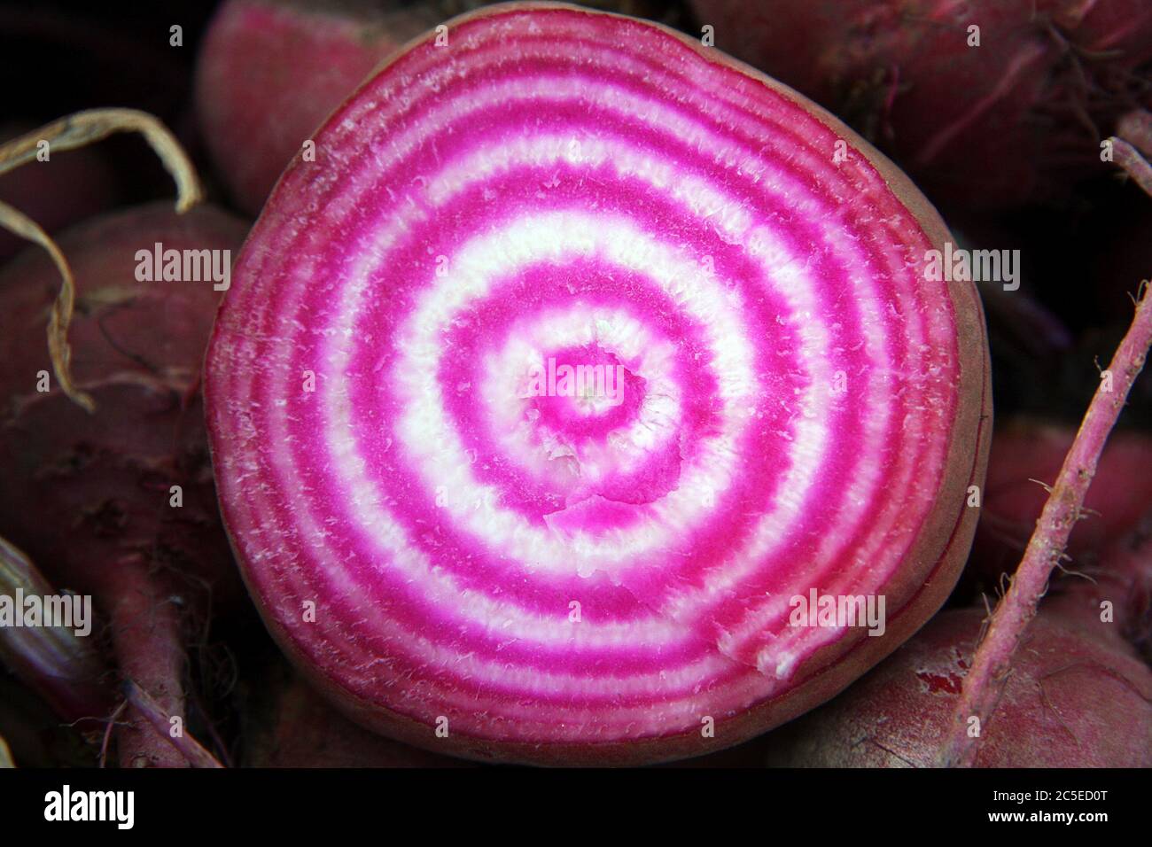 A cross-section of a raw beetroot on display at a market Stock Photo ...