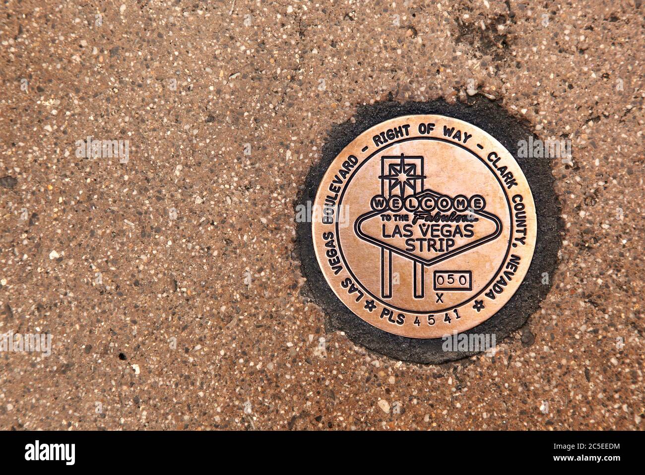 Las Vegas Boulevard sidewalk sign in copper. The 'Right of Way' sign is ...