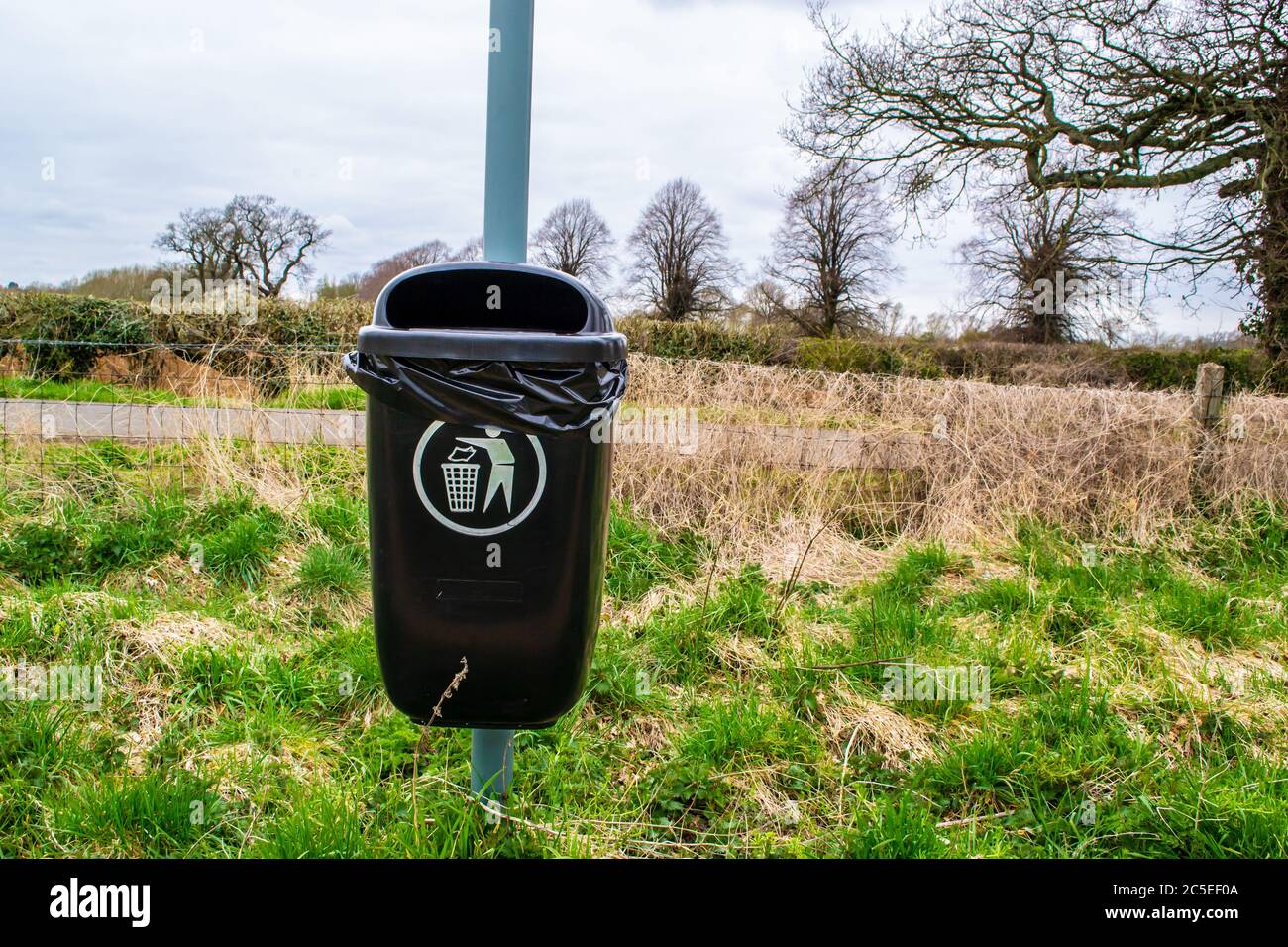 Rubbish bin in the countryside Stock Photo - Alamy