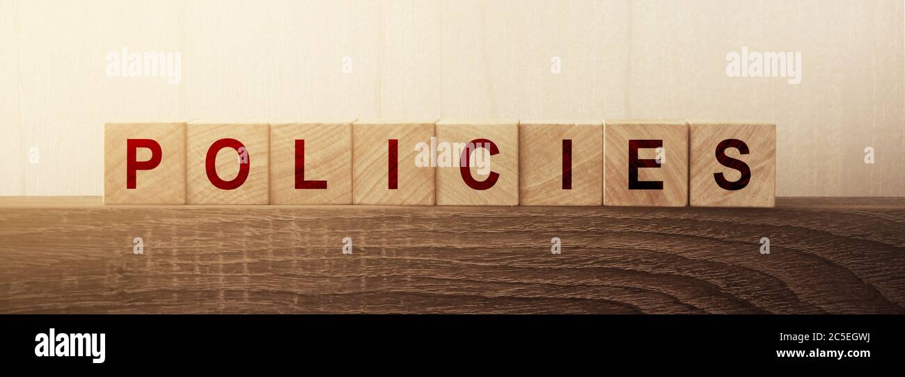 word policies composed of wooden cubes with letters, insurance ...