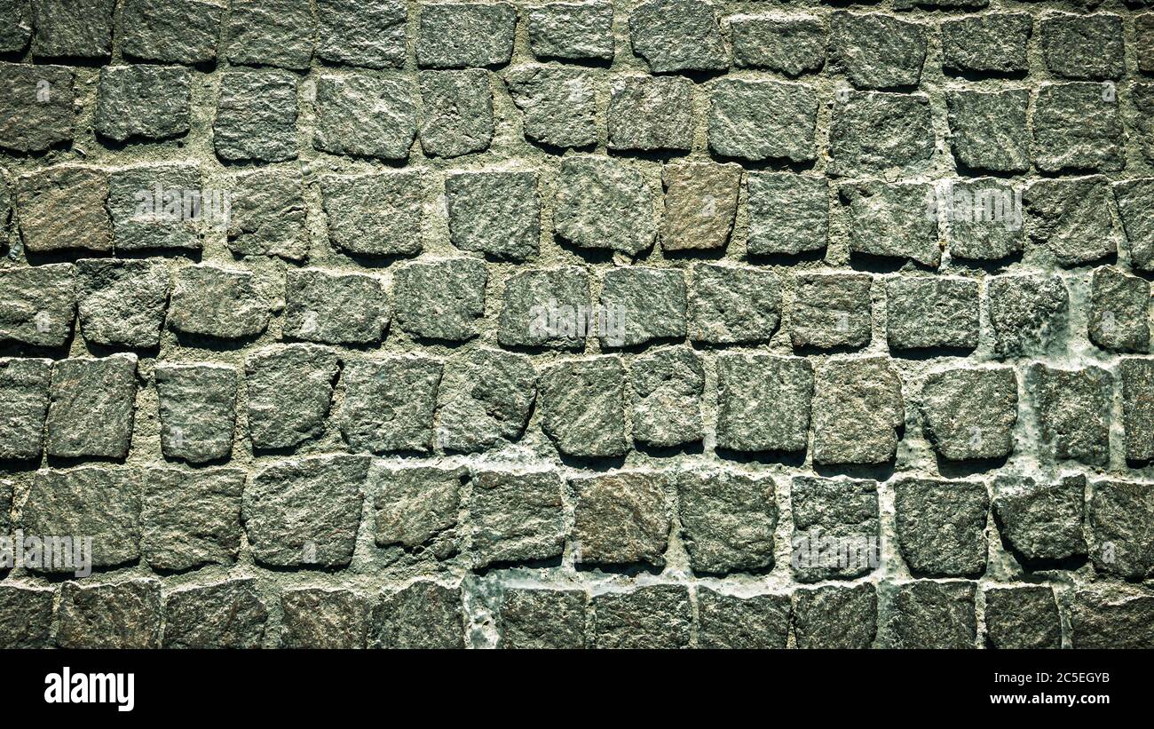 Cobblestone pavement texture background. Top view of stone road. Detail ...