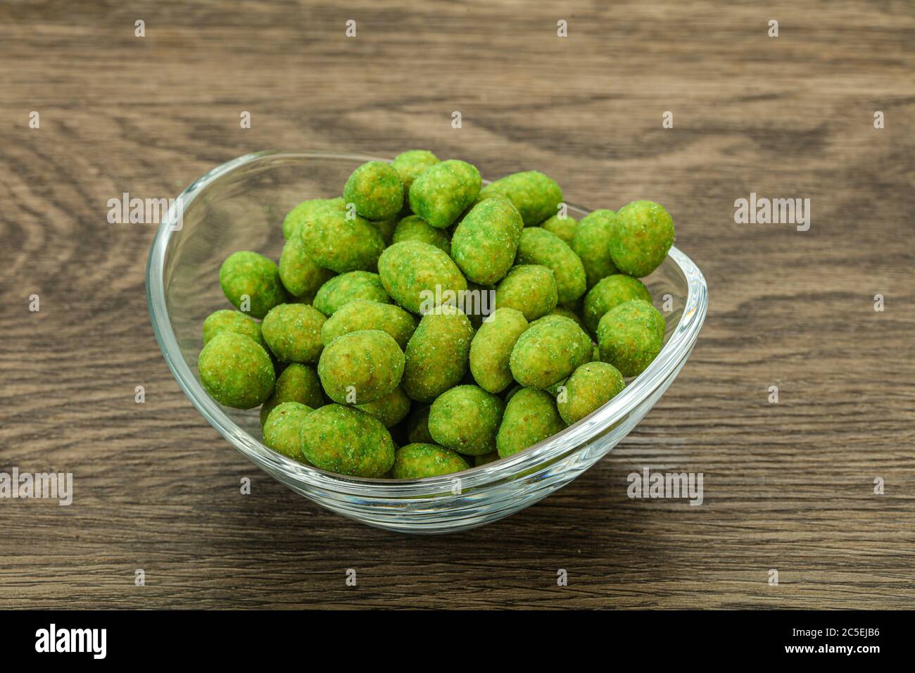 Spicy wasabi peanuts snack in the bowl Stock Photo - Alamy