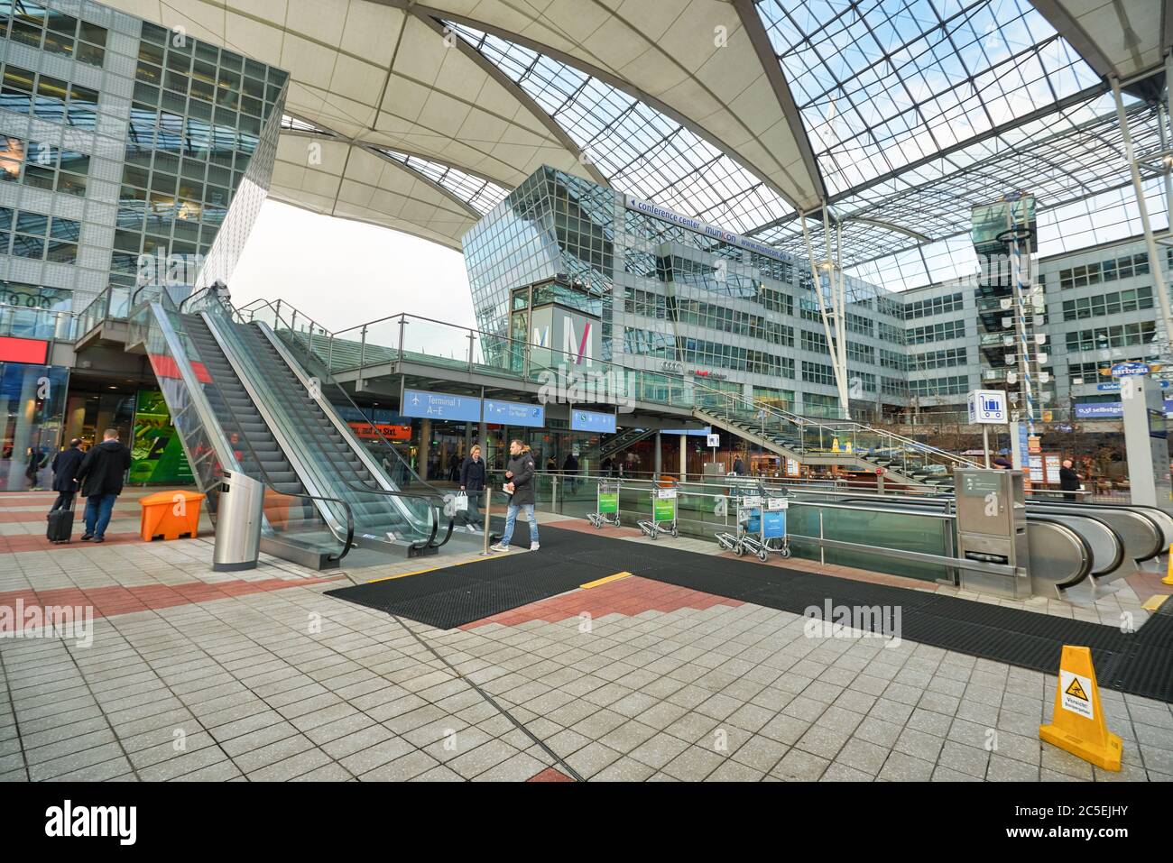Escalator munich airport hi-res stock photography and images - Alamy
