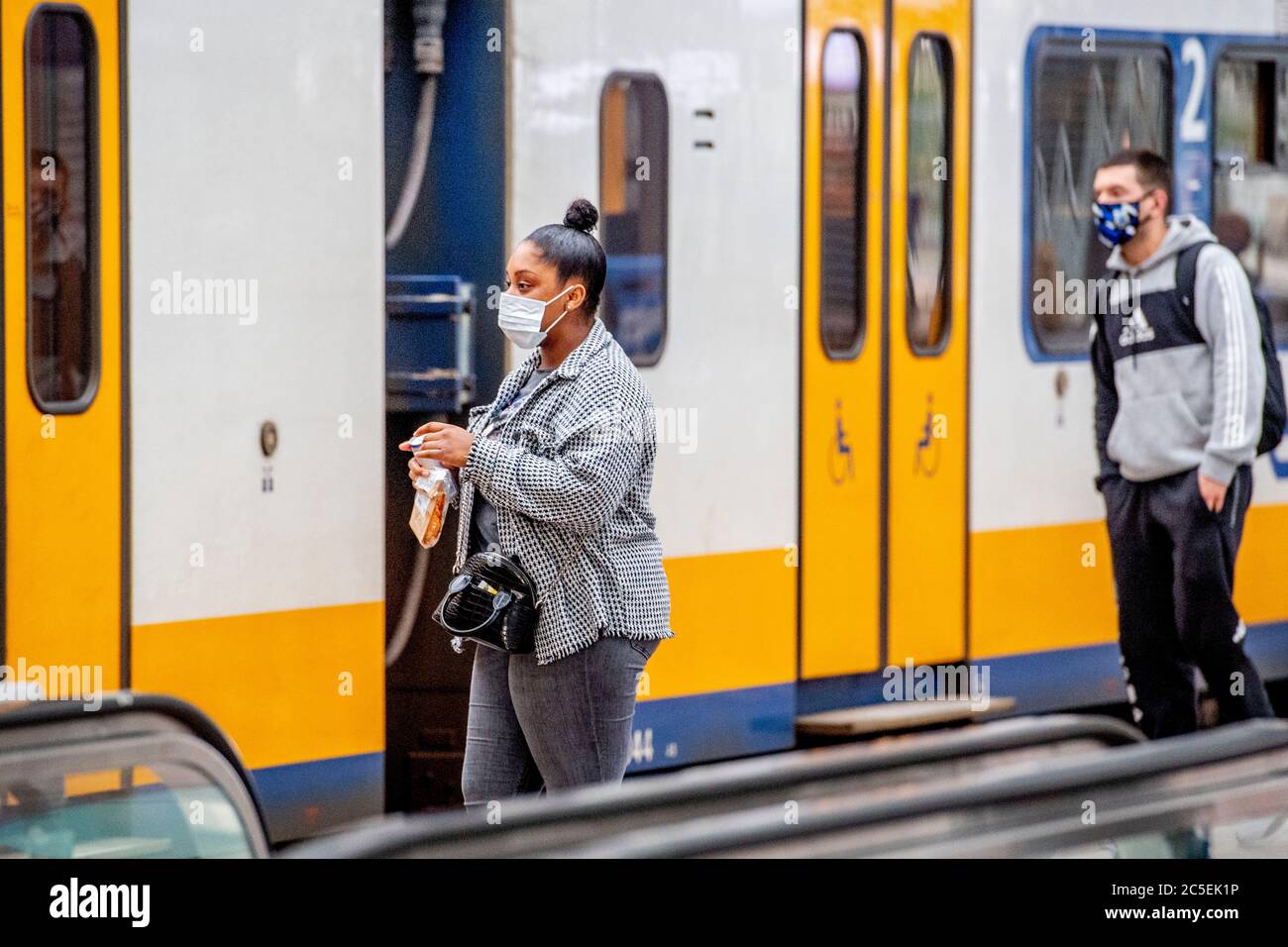 People seen wearing face masks as a precaution against Covid-19 at a ...