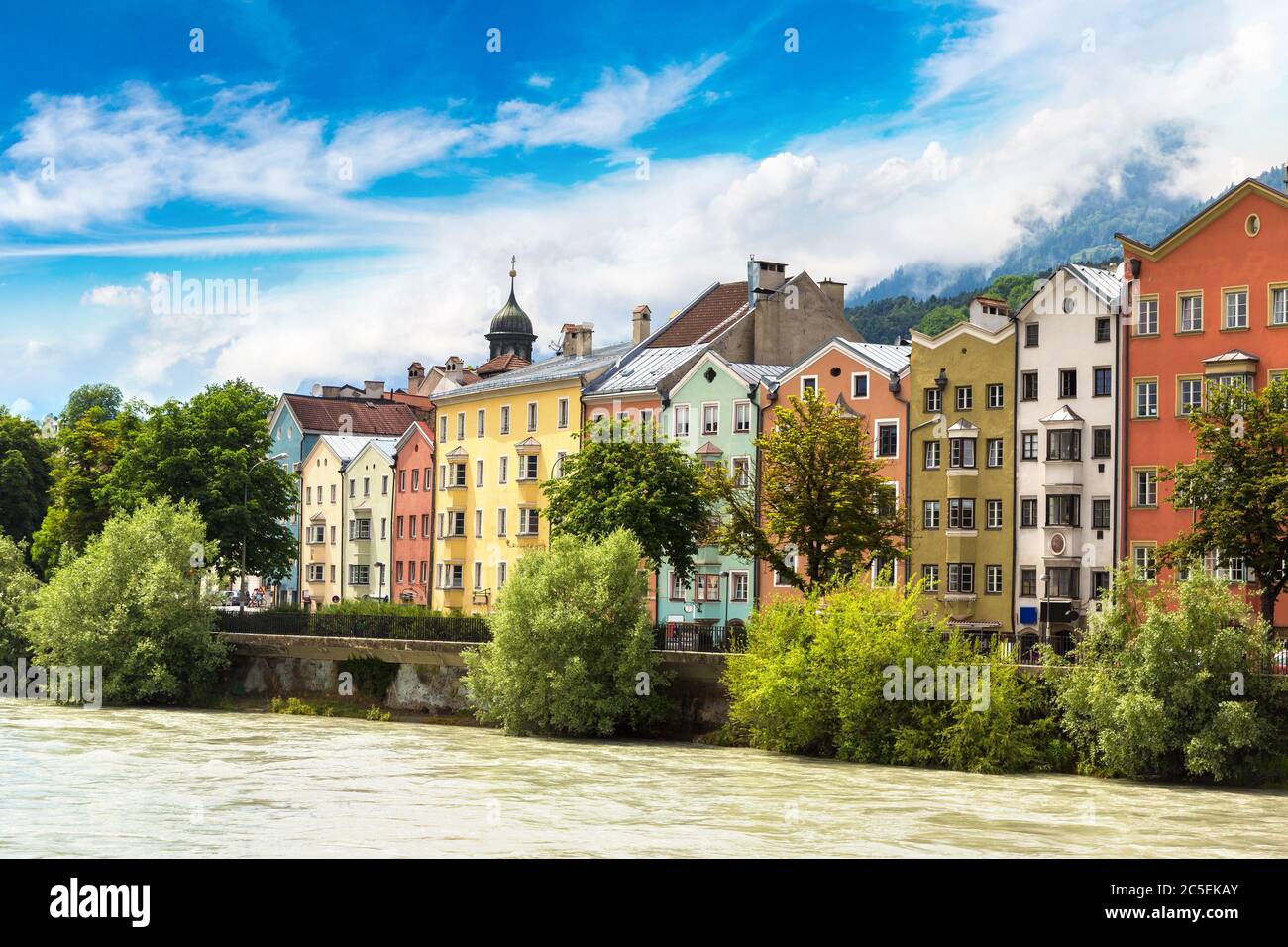 Building facade and Alps mountains behind in Innsbruck in a beautiful ...