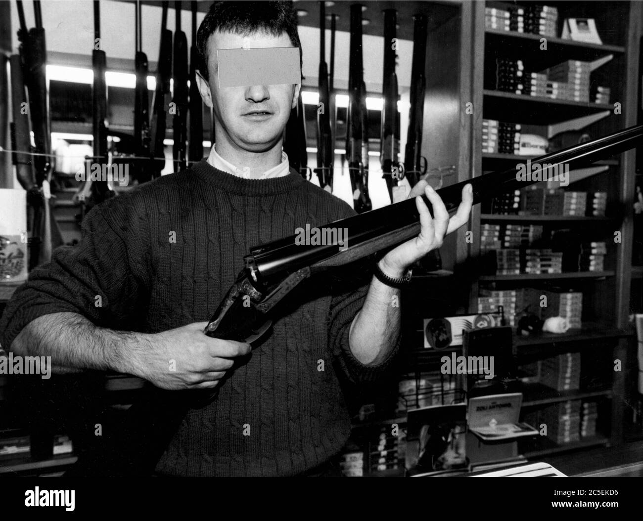 Archives 90ies: gunsmith holding a gun, 1995, Lyon, France Stock Photo ...