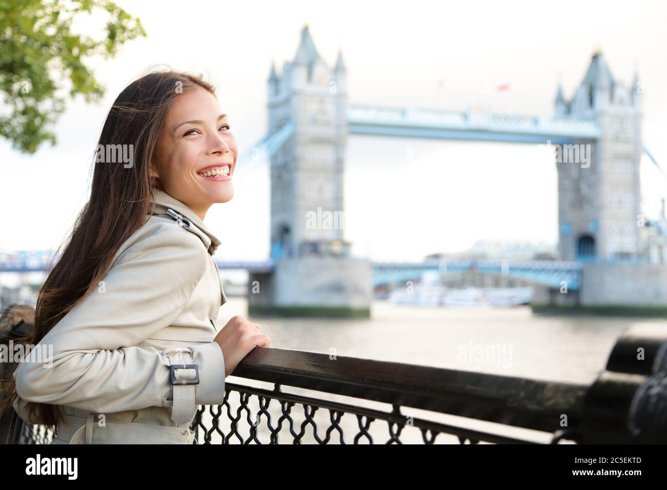 People in London - woman happy by Tower Bridge Stock Photo - Alamy