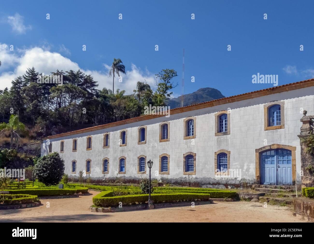 Old two-story building, from the colonial period, with beautiful garden ...