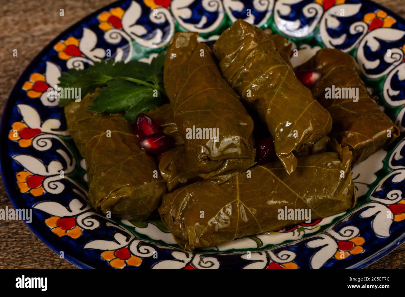 Caucasian traditional Dolma - minced meat in grape leaves Stock Photo ...