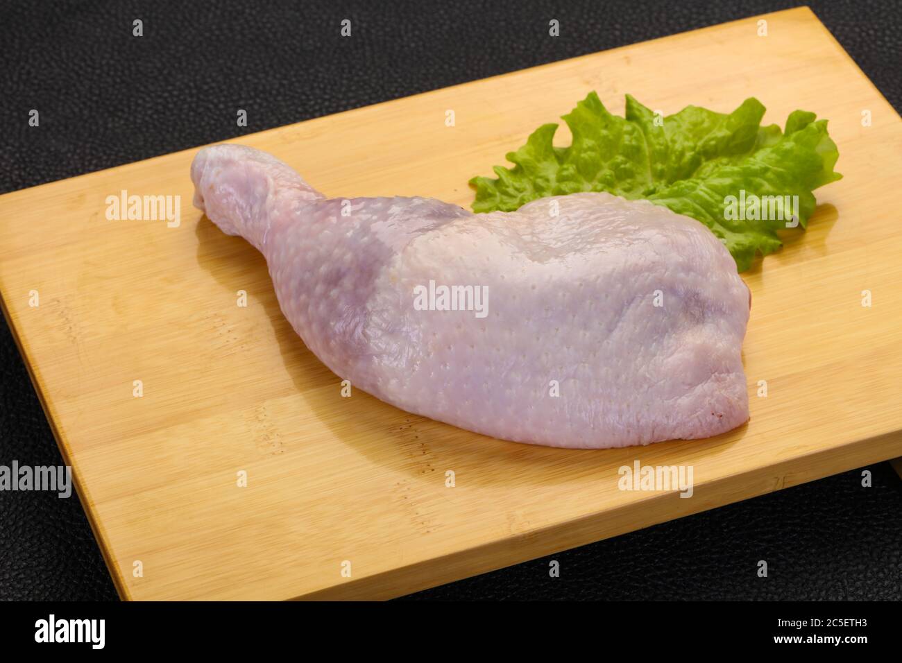 Raw chicken leg ready for cooking Stock Photo - Alamy