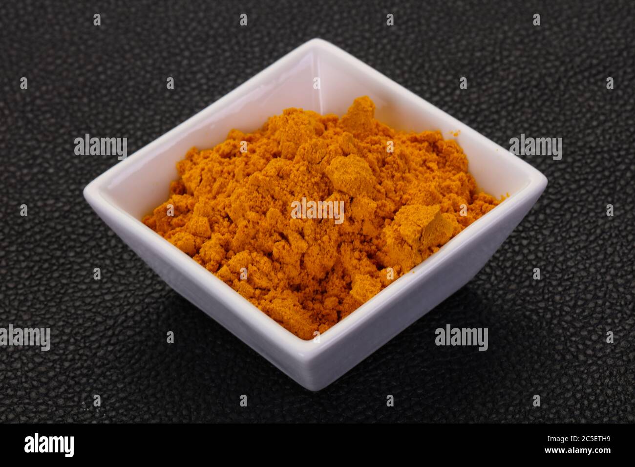 Aroma turmeric powder in the bowl Stock Photo - Alamy