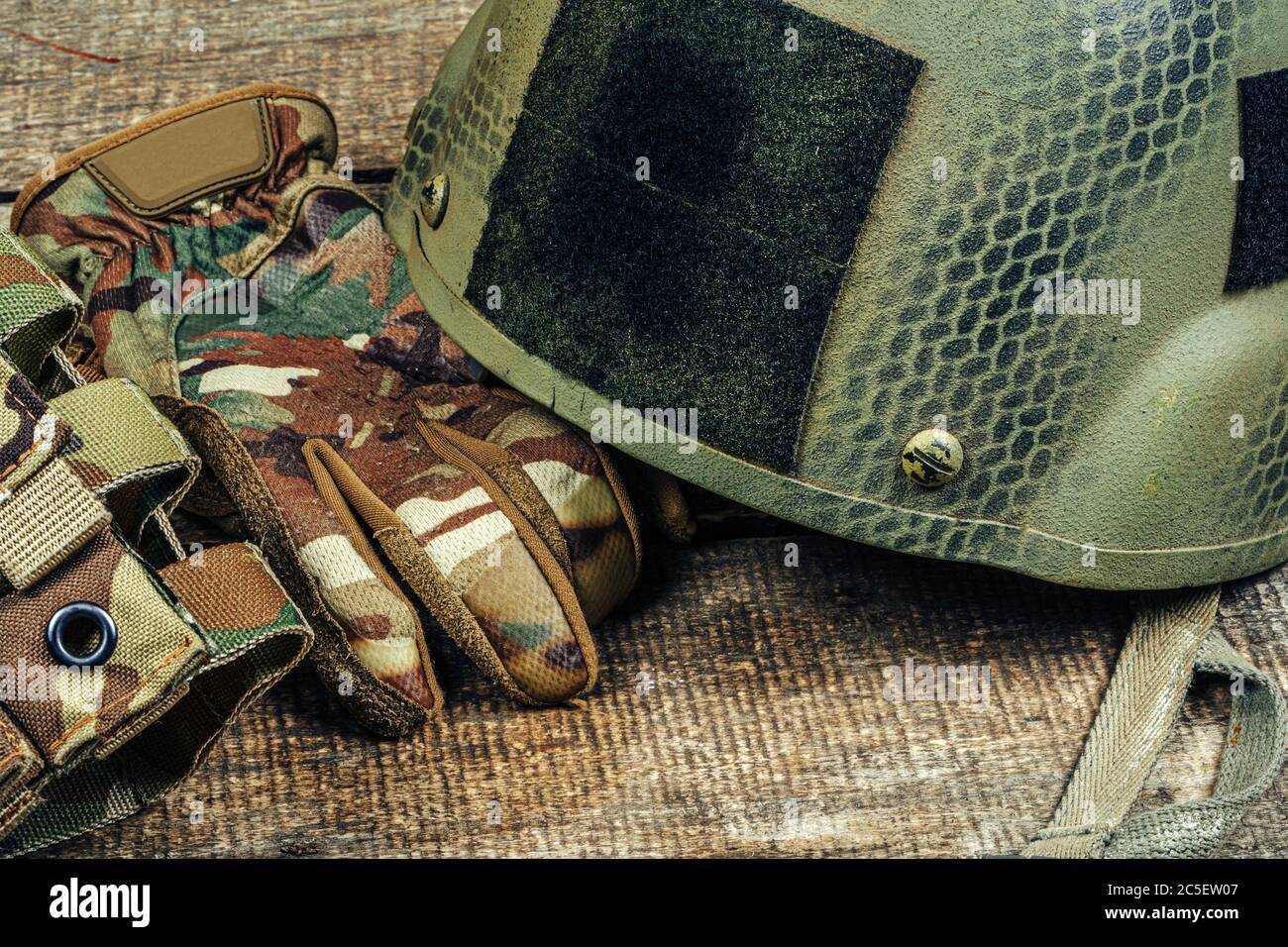 US military helmet on wooden background close up Stock Photo - Alamy