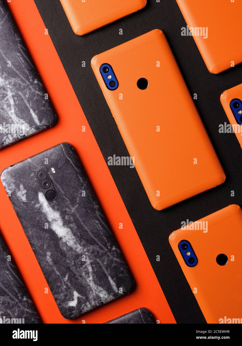 custom phone skin flatlay with different background colour Stock Photo ...