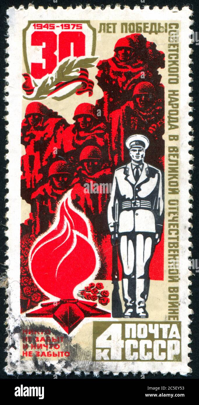 RUSSIA - CIRCA 1975: stamp printed by Russia, shows soldier and flame ...