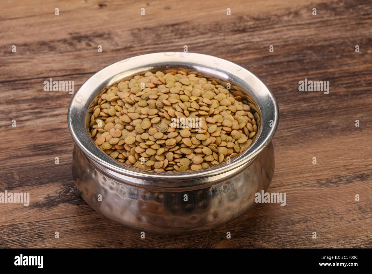 Vegan cuisine - Dry lentil heap isolated Stock Photo - Alamy