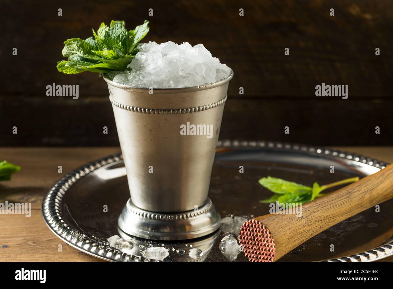 Frozen Boozy Bourbon Mint Julep in a Glass Stock Photo - Alamy