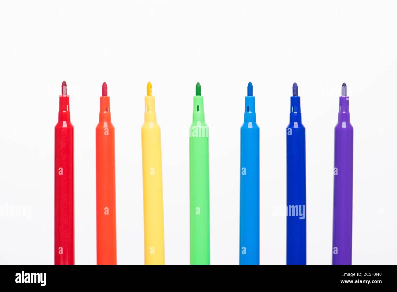 Top above overhead view photo of colorful markers with caps off ...