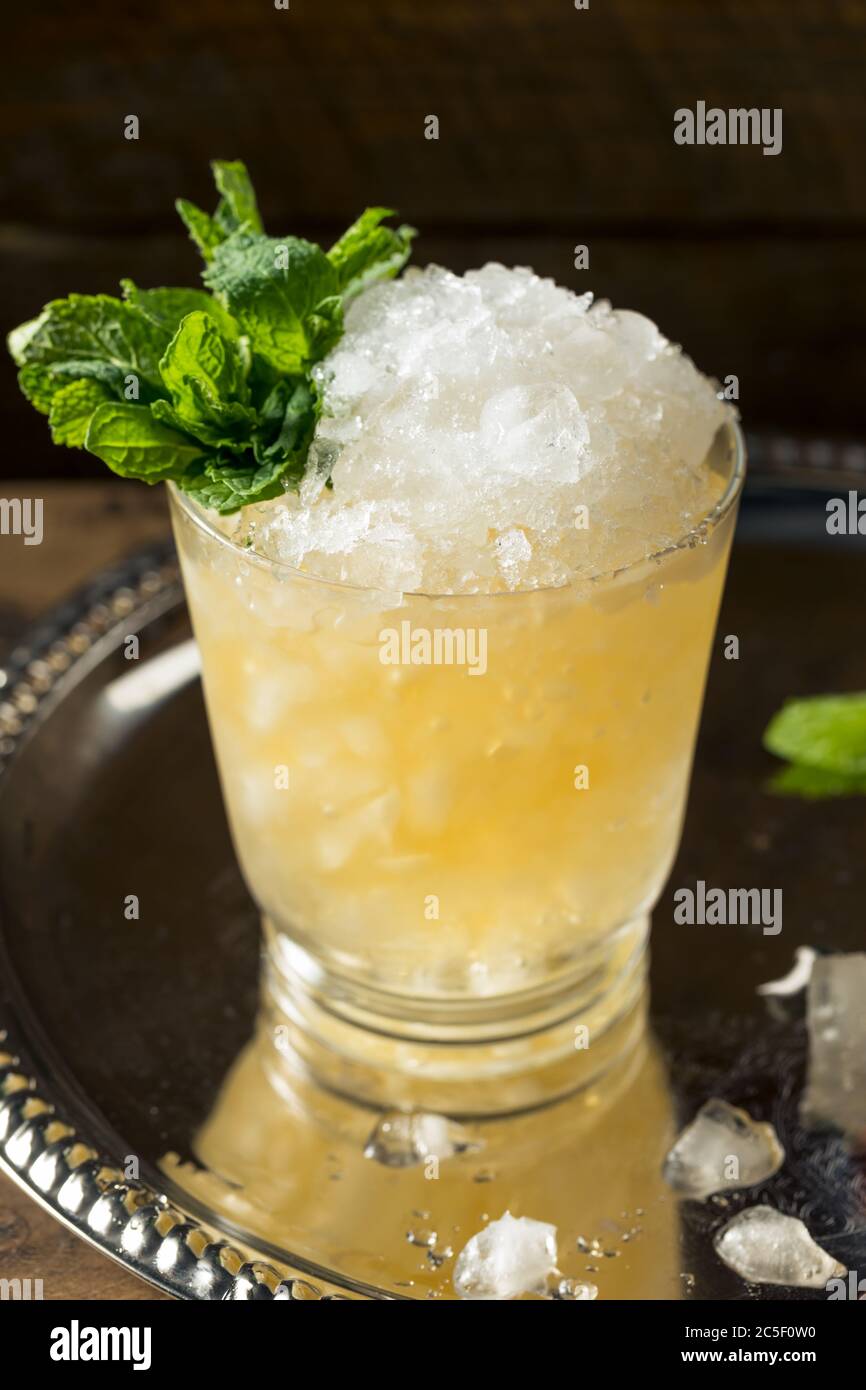 Frozen Boozy Bourbon Mint Julep in a Glass Stock Photo - Alamy