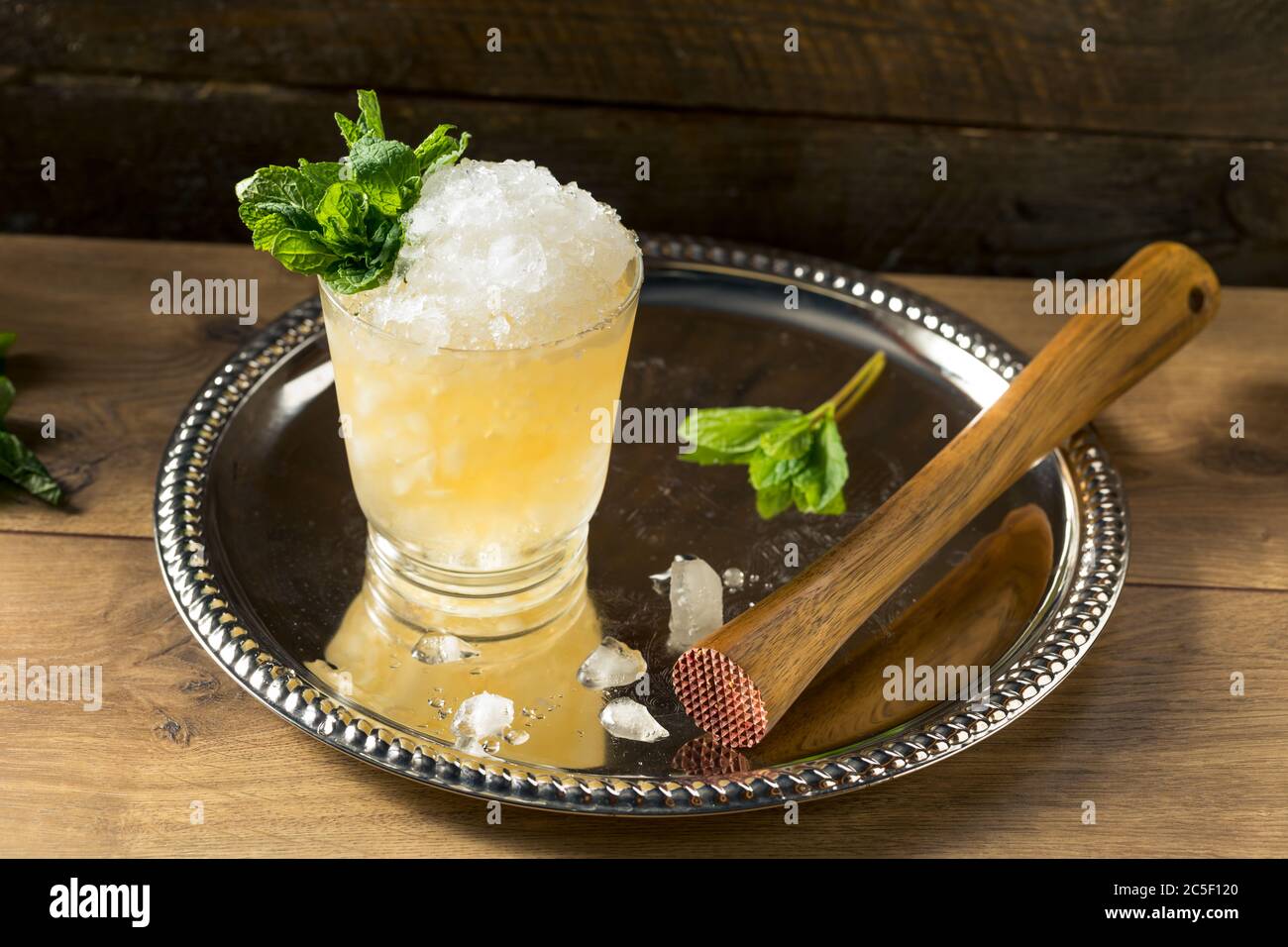 Frozen Boozy Bourbon Mint Julep in a Glass Stock Photo - Alamy