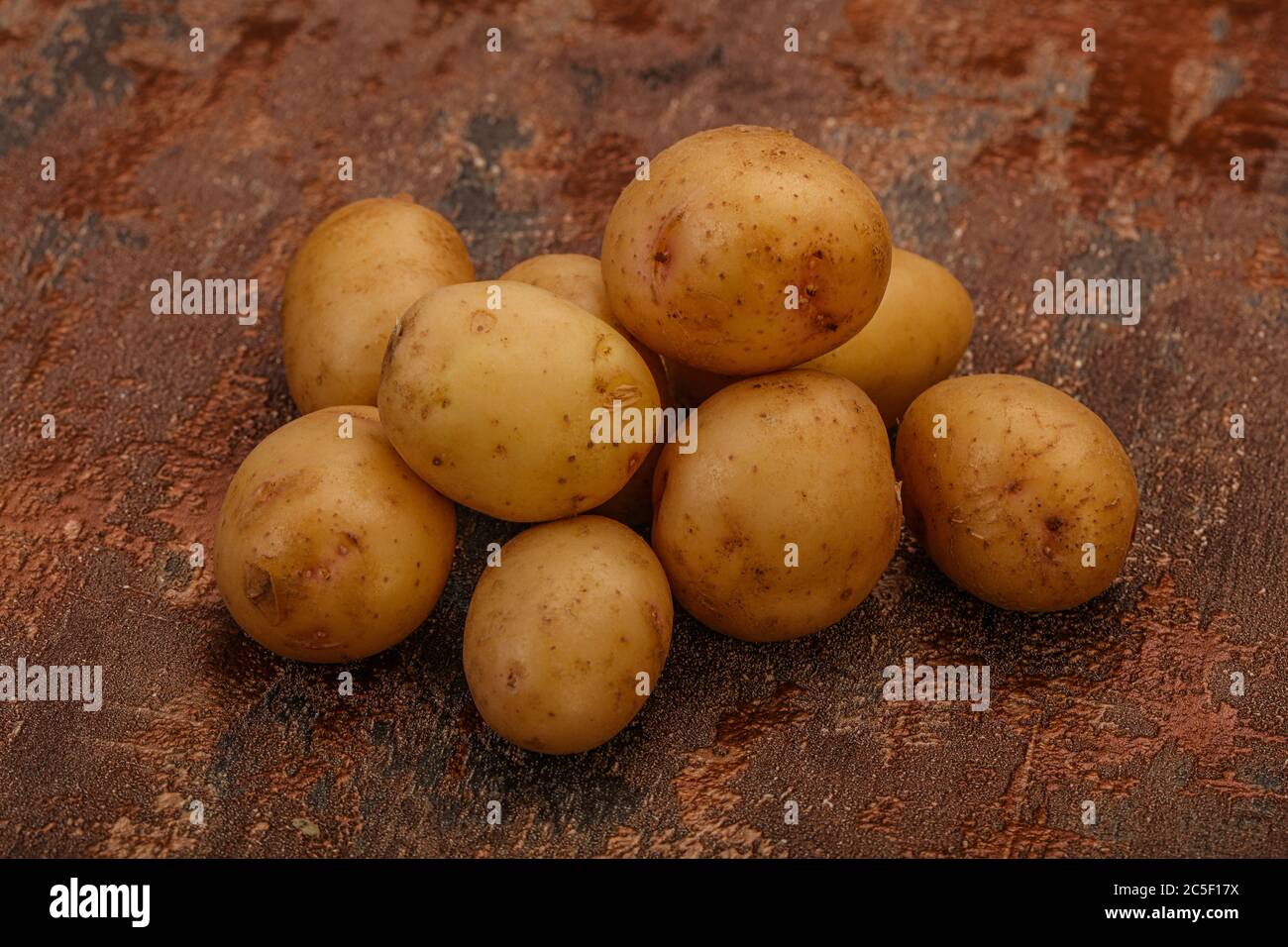 Raw fresh baby young potato heap Stock Photo - Alamy