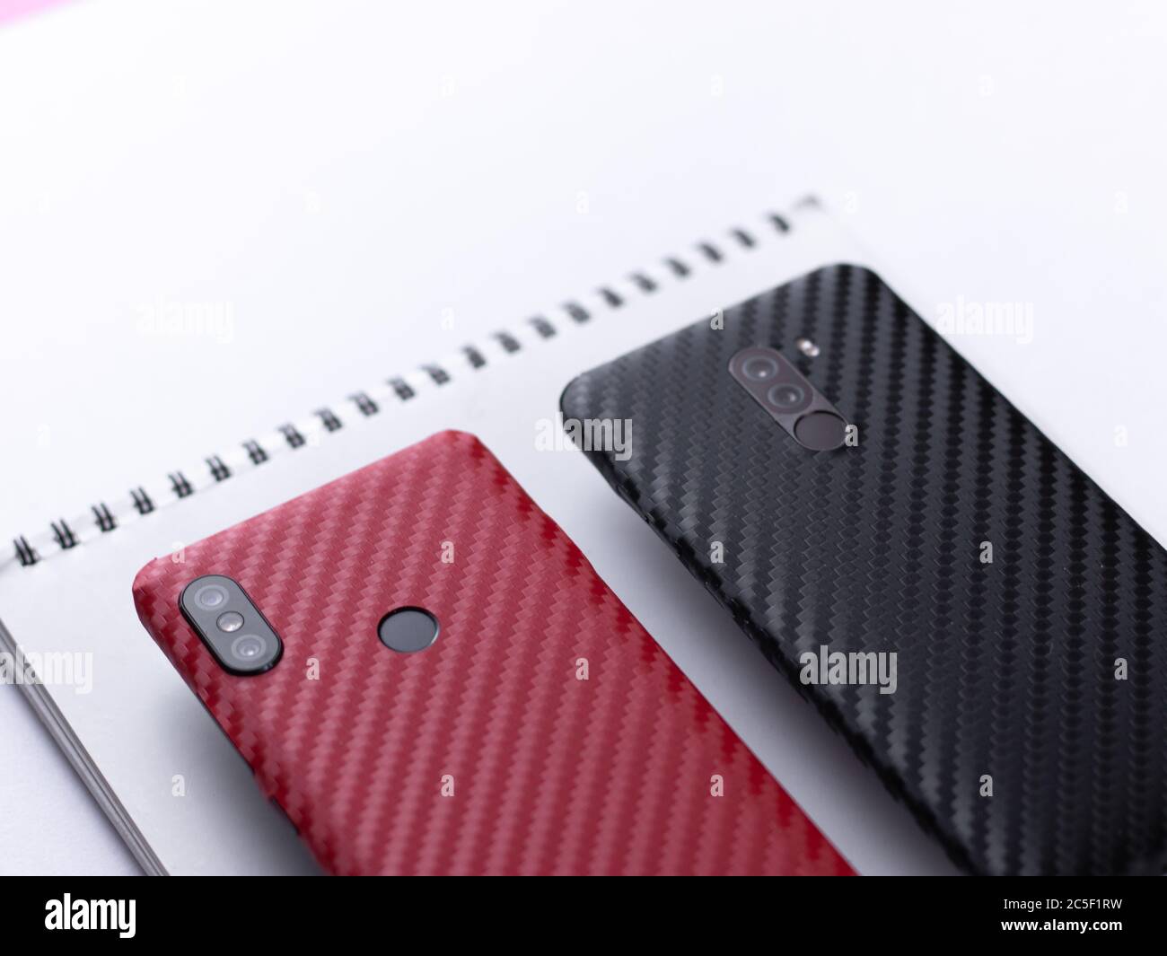 custom phone skin flatlay with different background colour Stock Photo ...