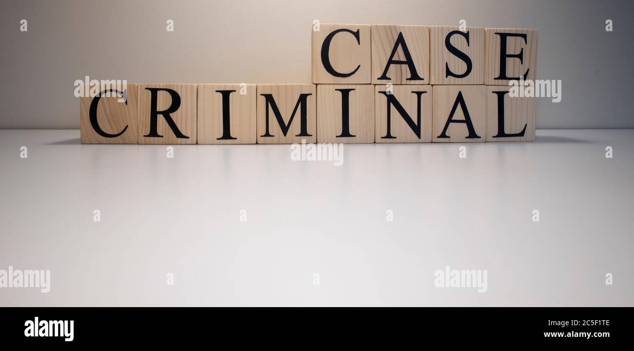 Criminal case word from wooden cubes. Crime and crime concept. Close up ...