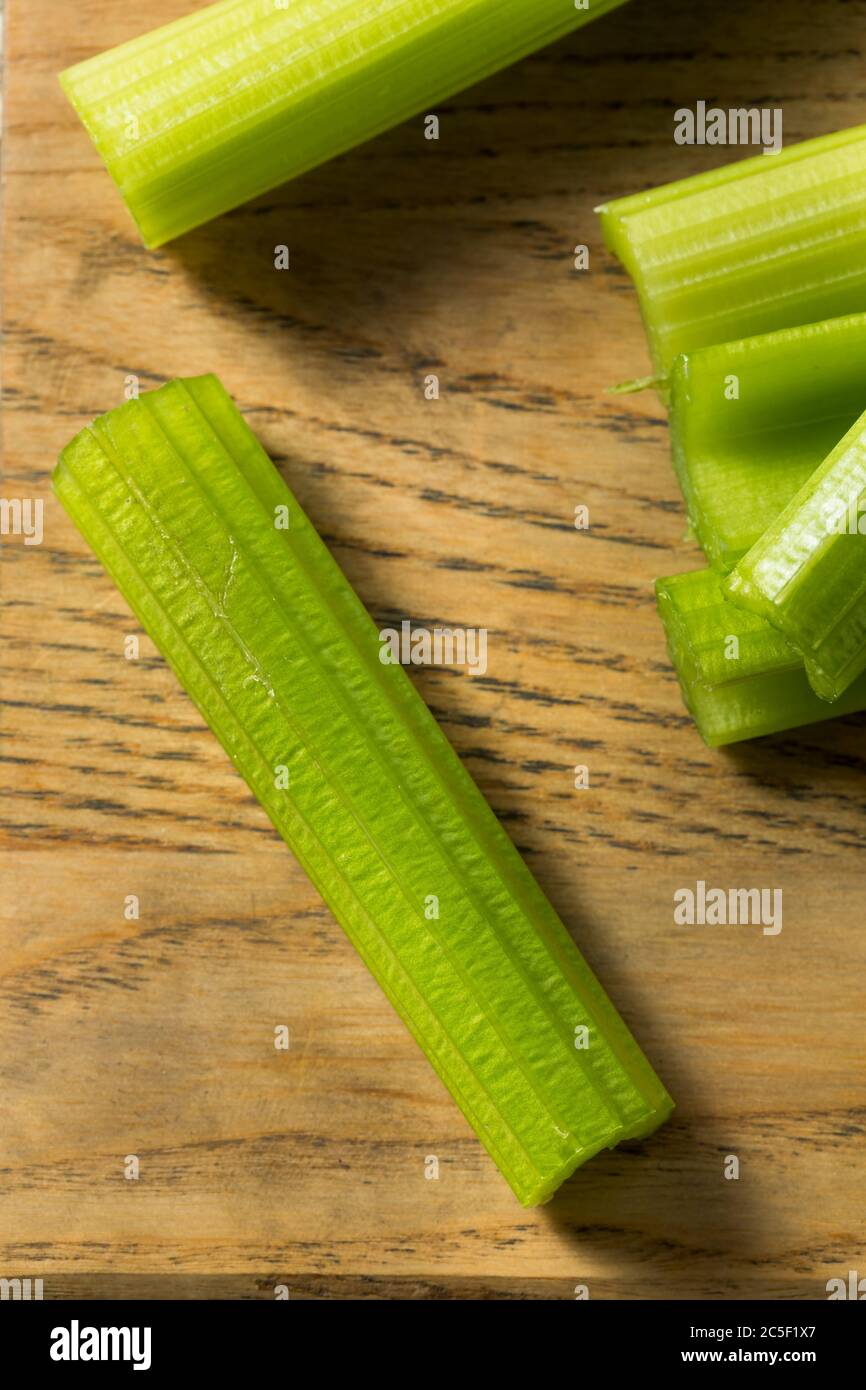 Organic Green Cut Celery Sticks Ready to Eat Stock Photo - Alamy