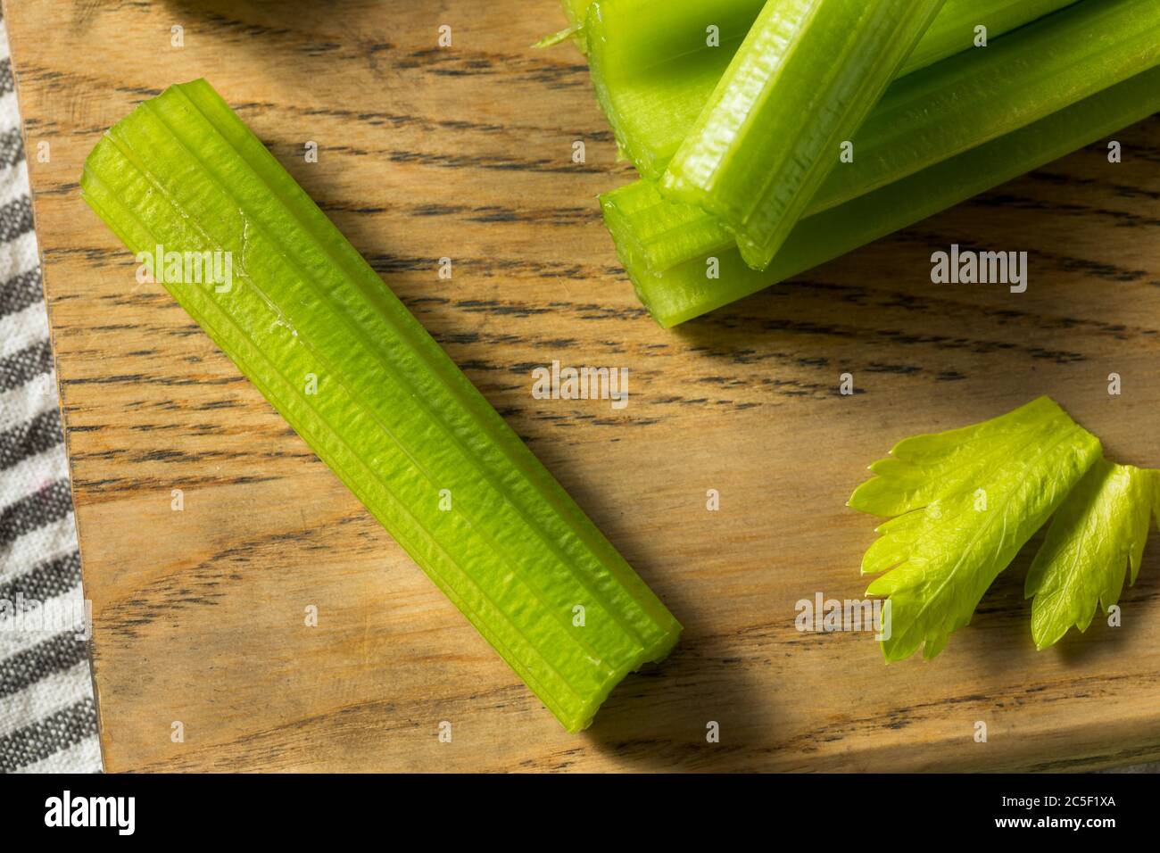 Organic Green Cut Celery Sticks Ready to Eat Stock Photo - Alamy