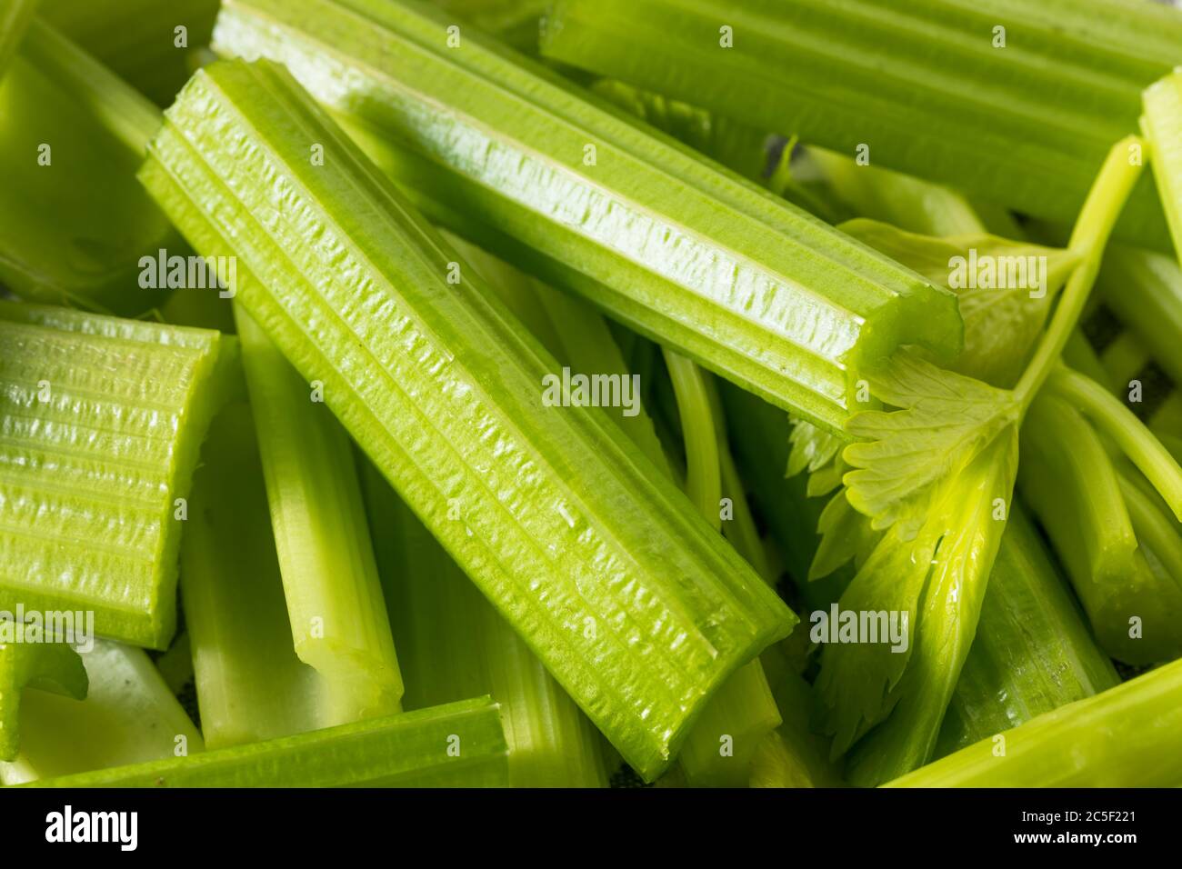 Organic Green Cut Celery Sticks Ready to Eat Stock Photo - Alamy