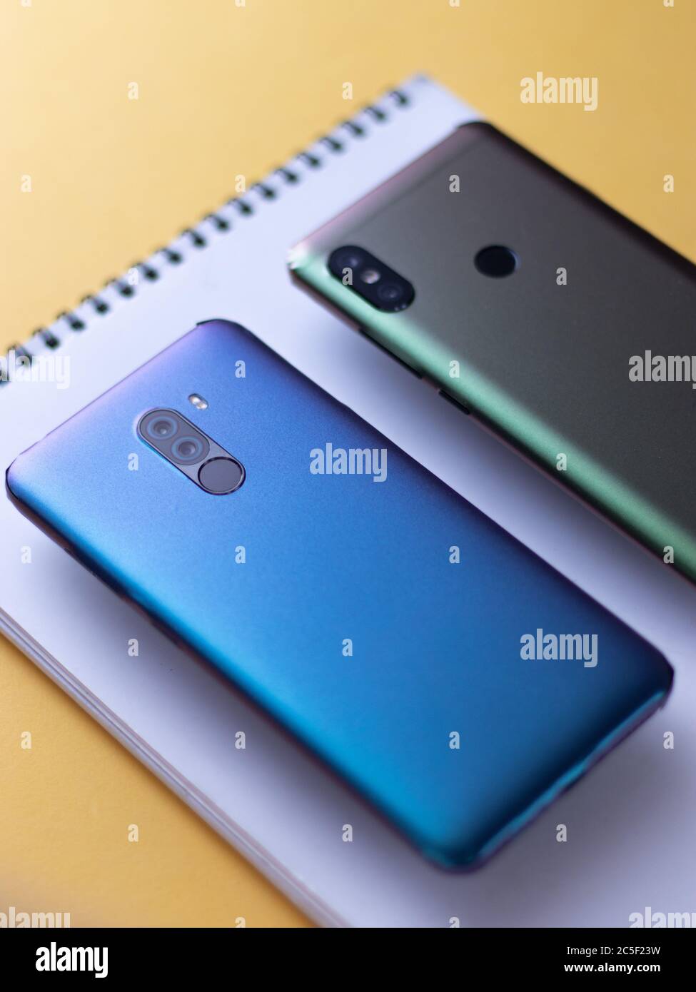 custom phone skin flatlay with different background colour Stock Photo ...