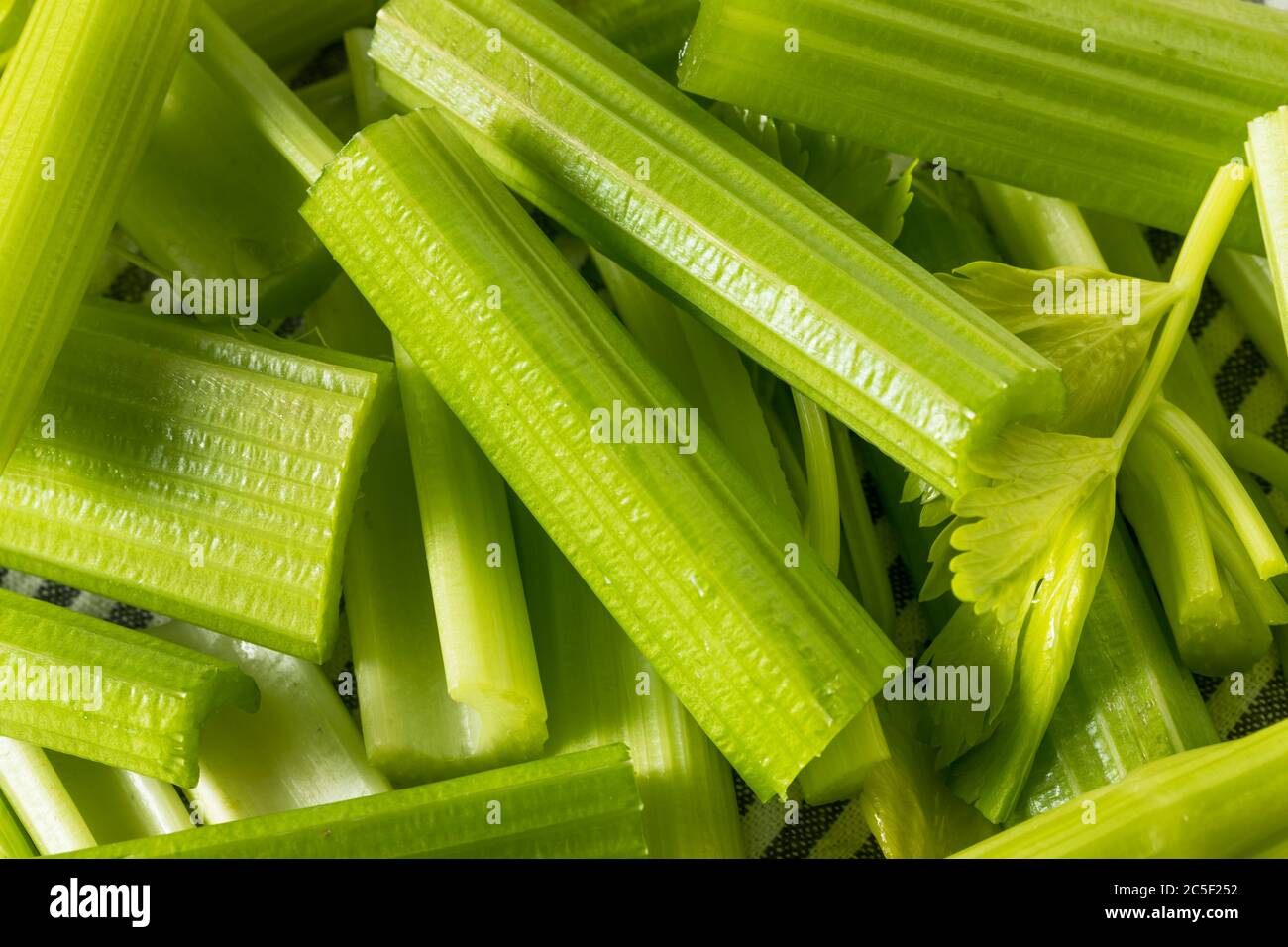 Organic Green Cut Celery Sticks Ready to Eat Stock Photo - Alamy