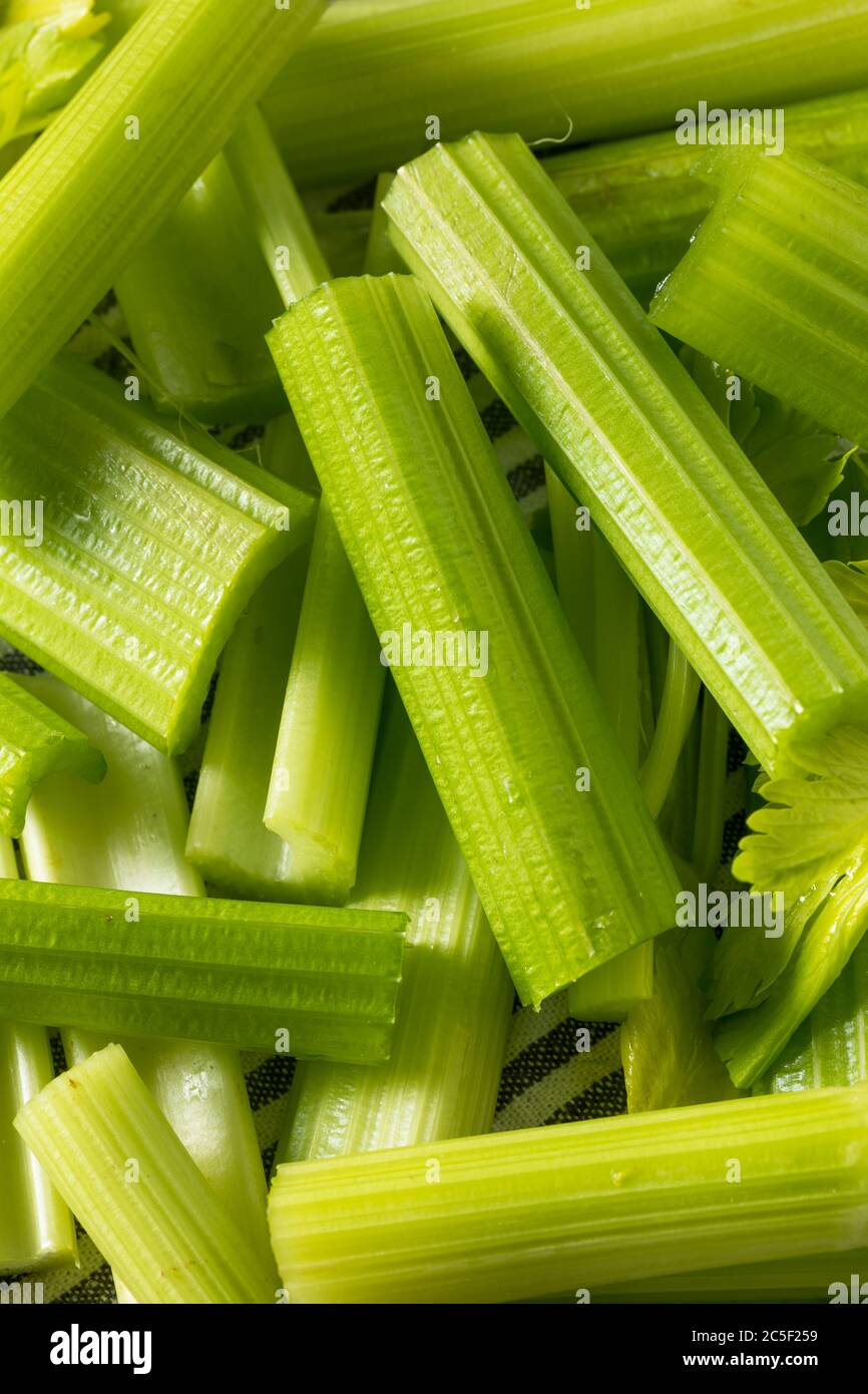 Organic Green Cut Celery Sticks Ready to Eat Stock Photo - Alamy