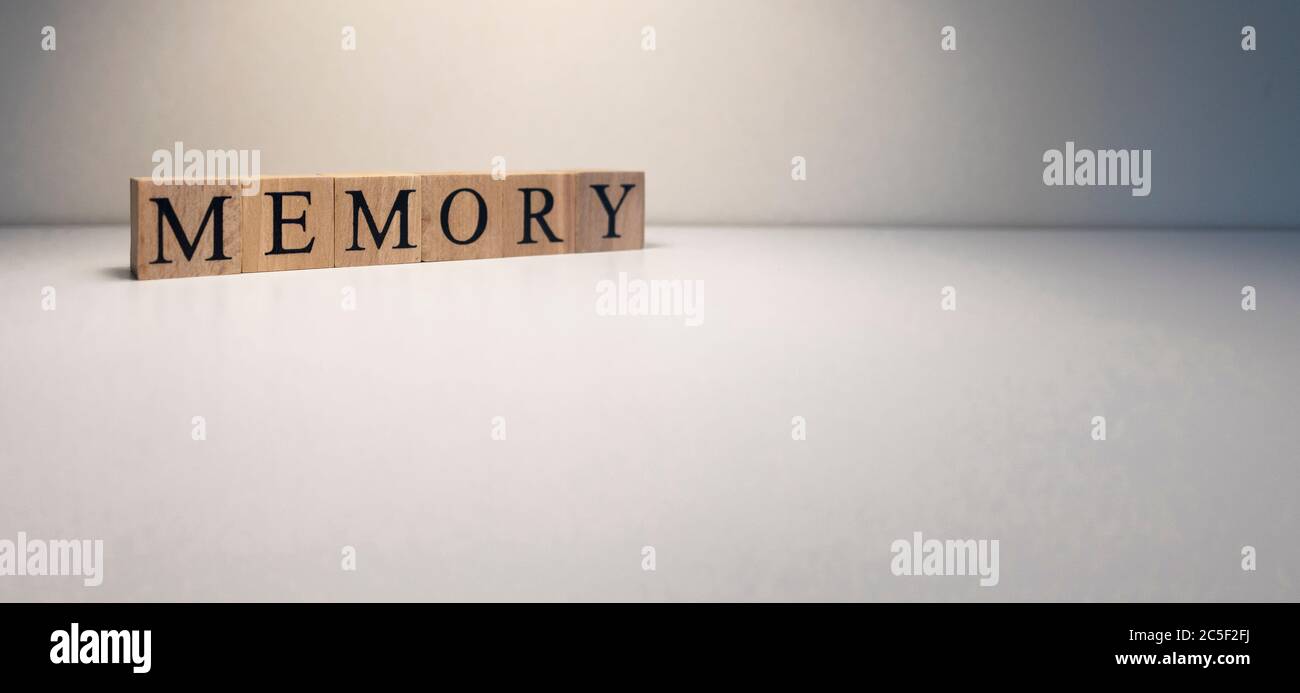 Memory text from wooden cubes. Photo was taken in white background ...