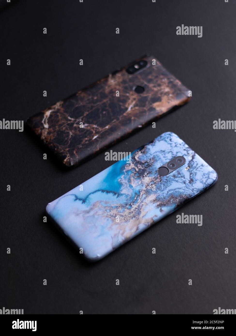 custom phone skin flatlay with different background colour Stock Photo ...
