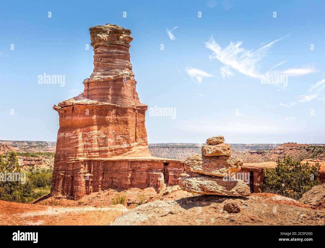 The famous Lighthouse Rock and a stone pile at Palo Duro Canyon State ...