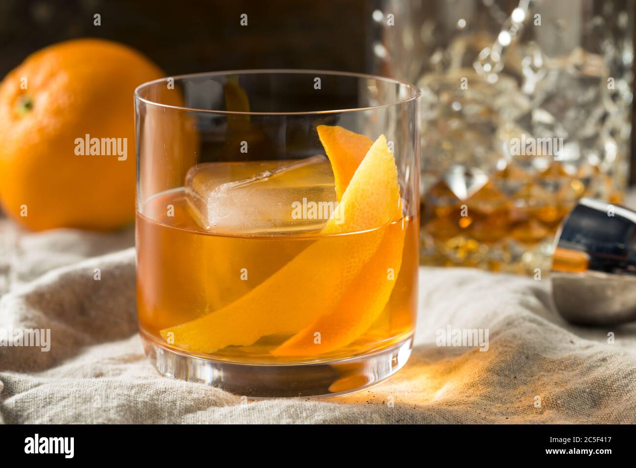 Boozy Bourbon Old Fashioned Cocktail with Orange and Lemon Stock Photo ...